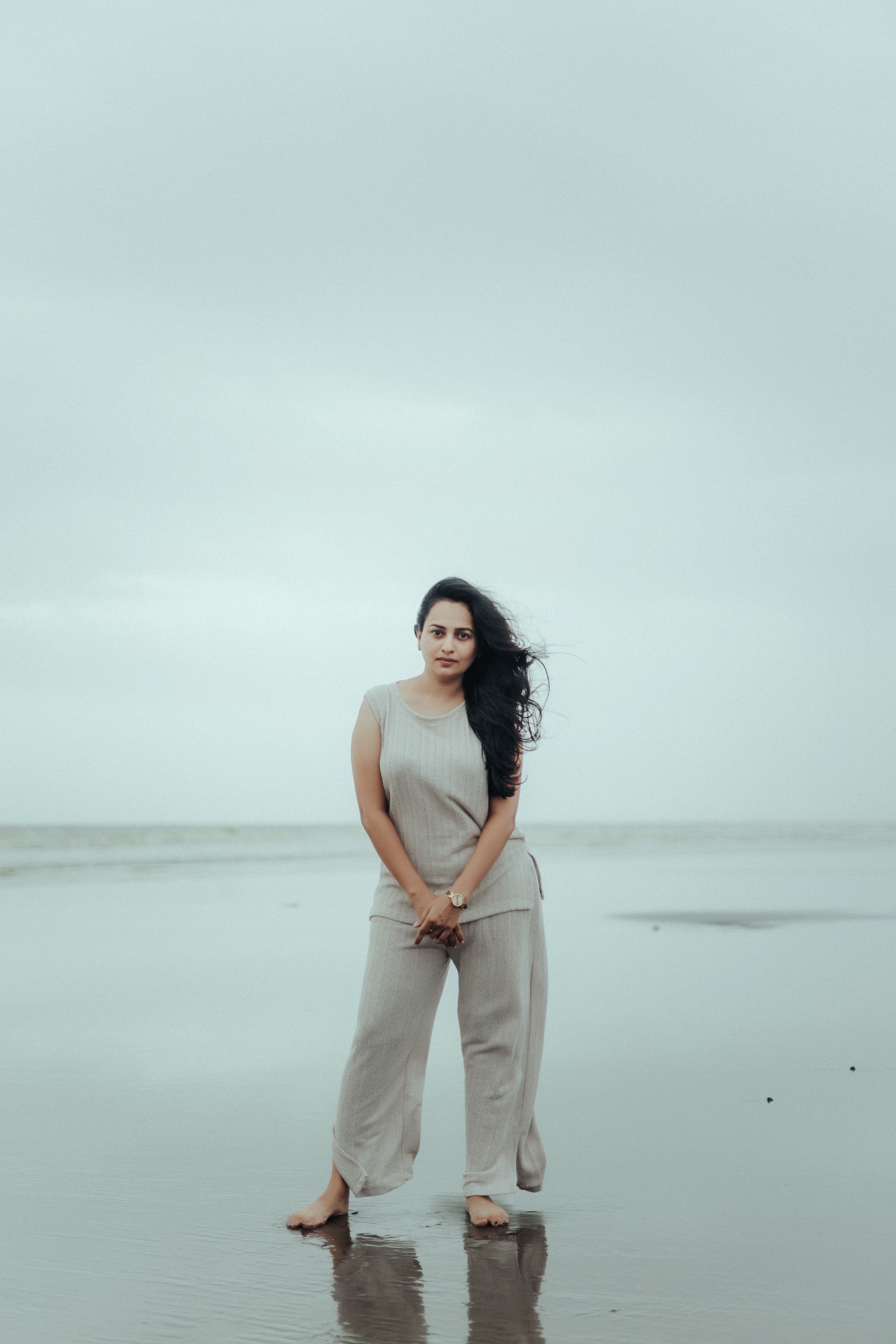 Woman Posing on Sea Shore · Free Stock Photo