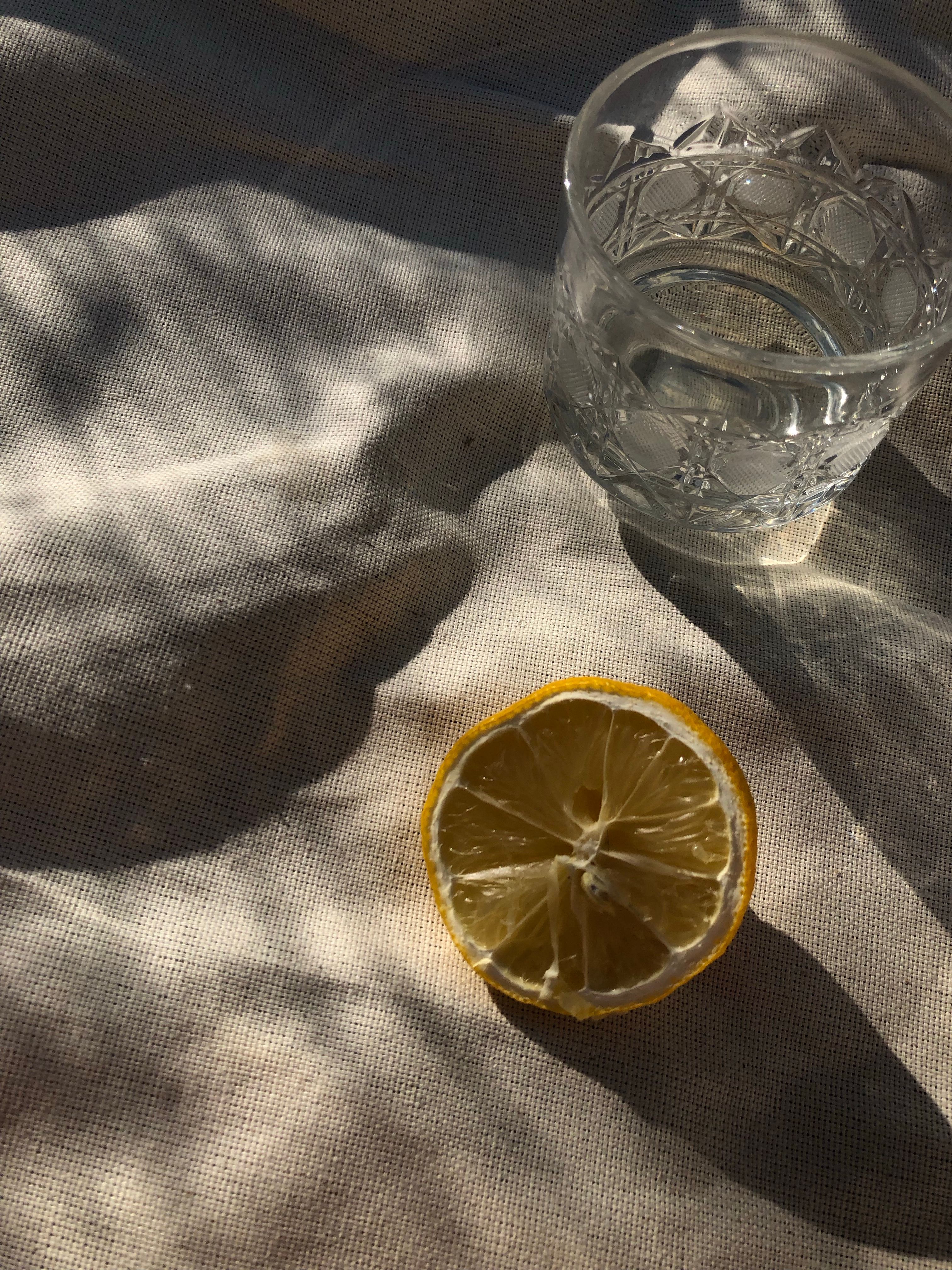 Lemon Slice and Glass · Free Stock Photo