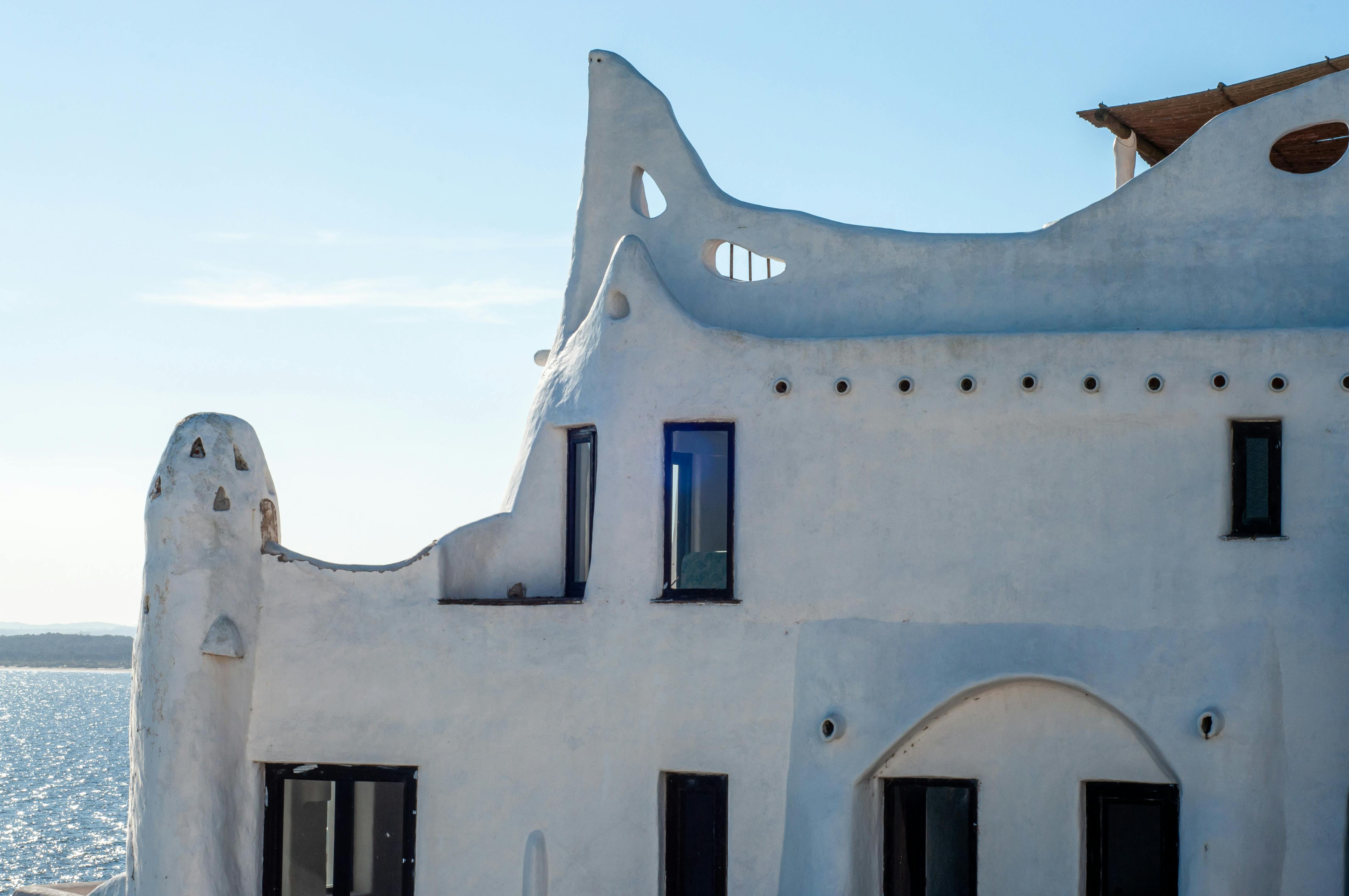 White Building on Sea Shore · Free Stock Photo
