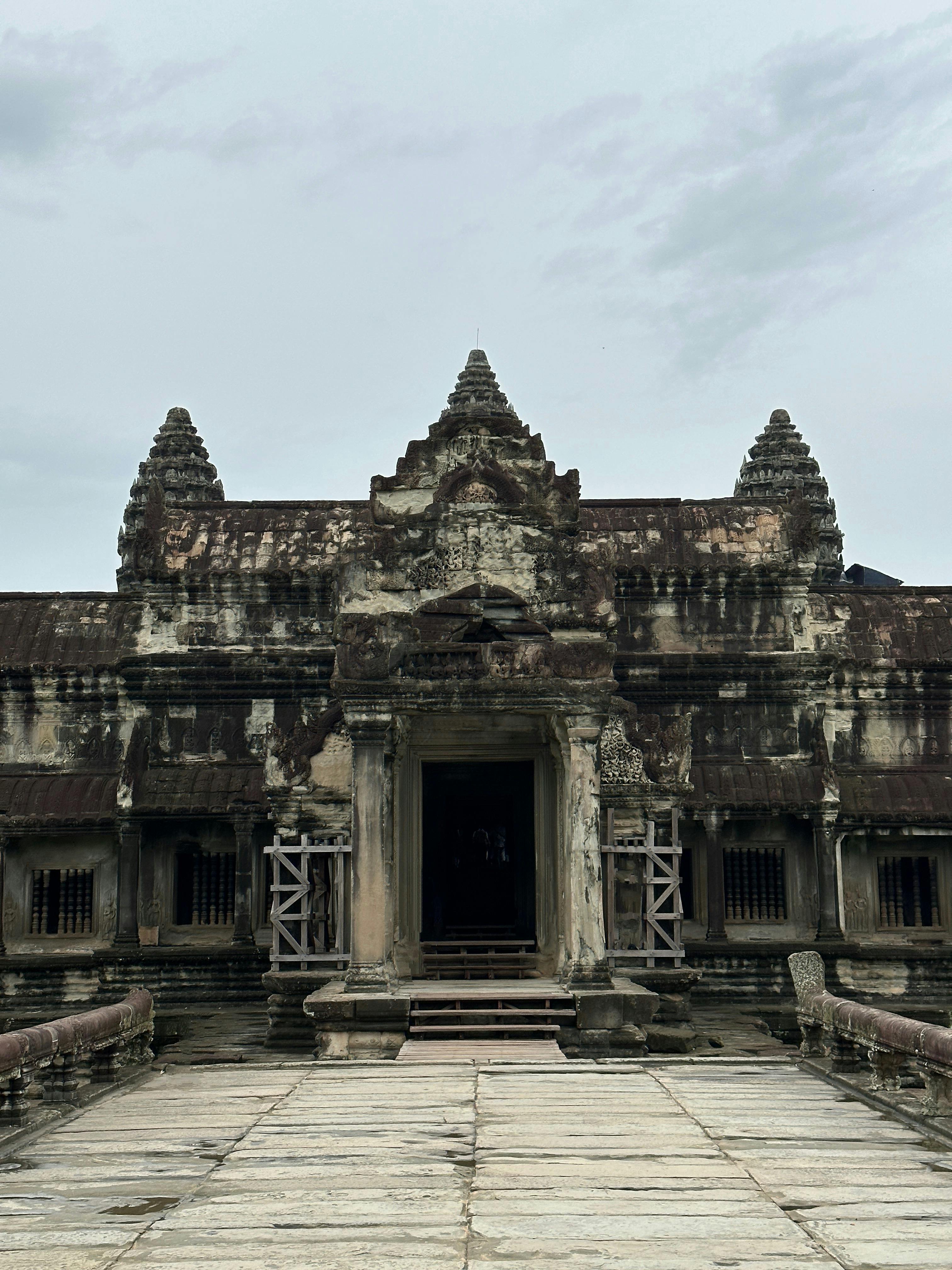 Group of Buddhist Monks in Front of Angkor Wat Temple · Free Stock Photo