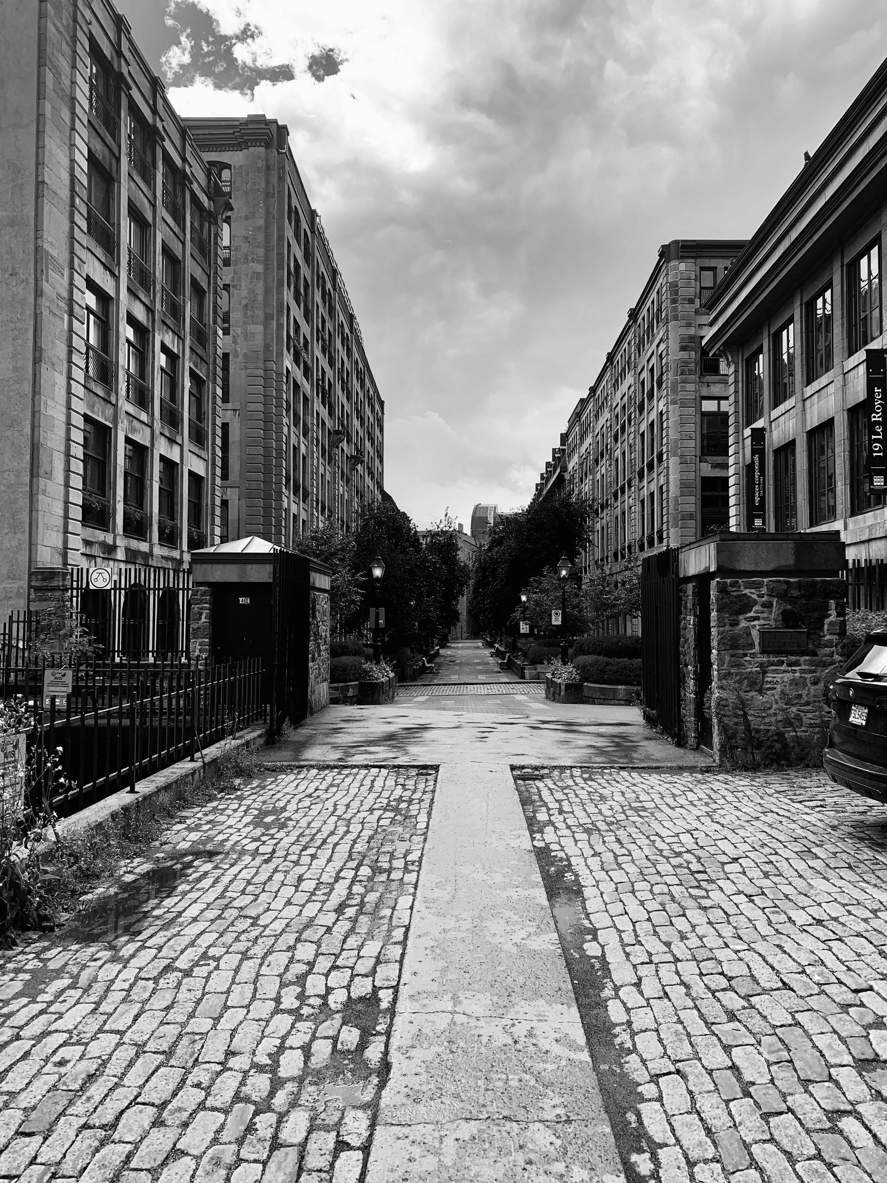 Crossroads of Narrow Streets in the Shadow of a Ferris Wheel · Free ...