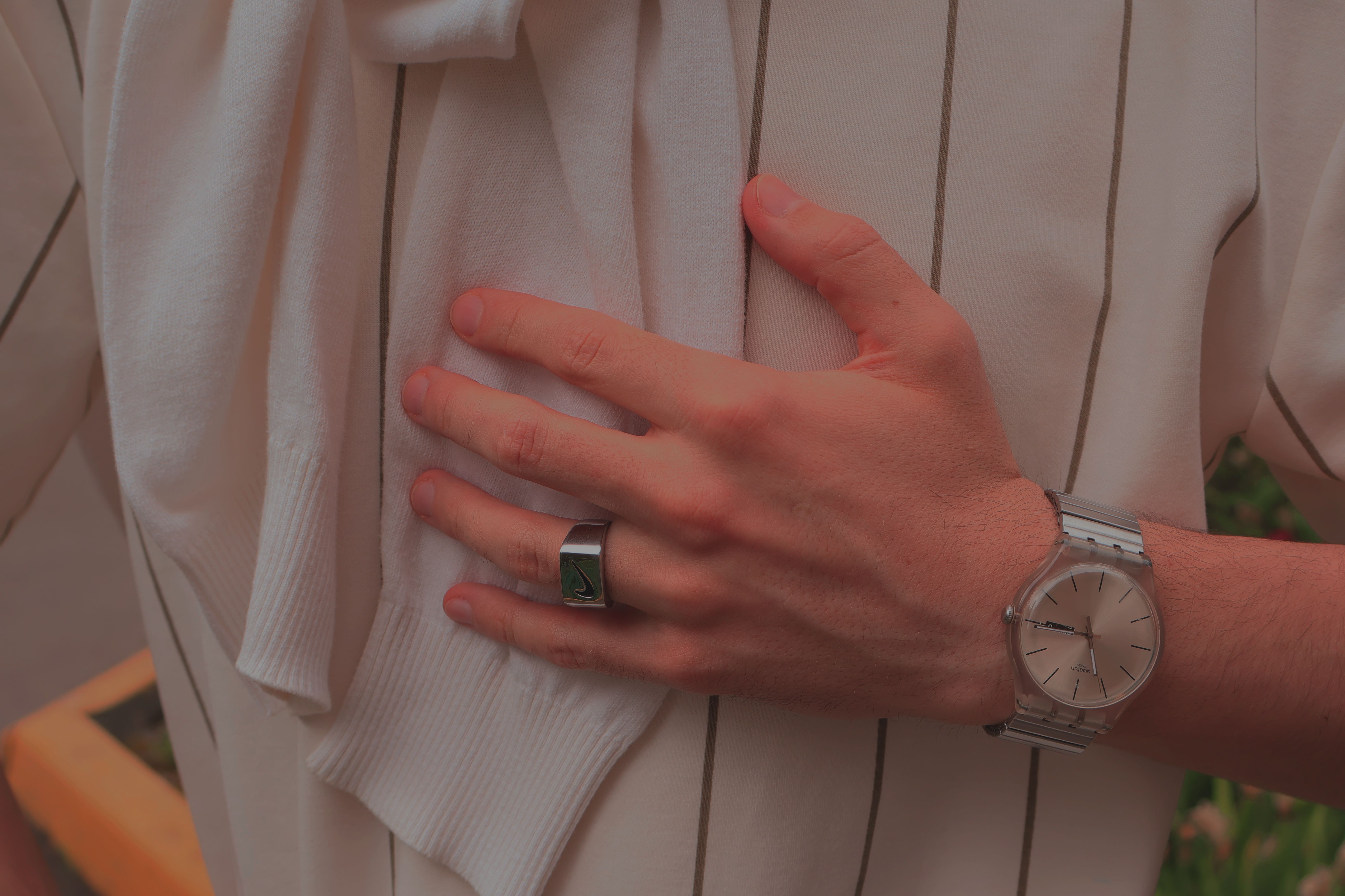 Hand with Ring and Wristwatch · Free Stock Photo