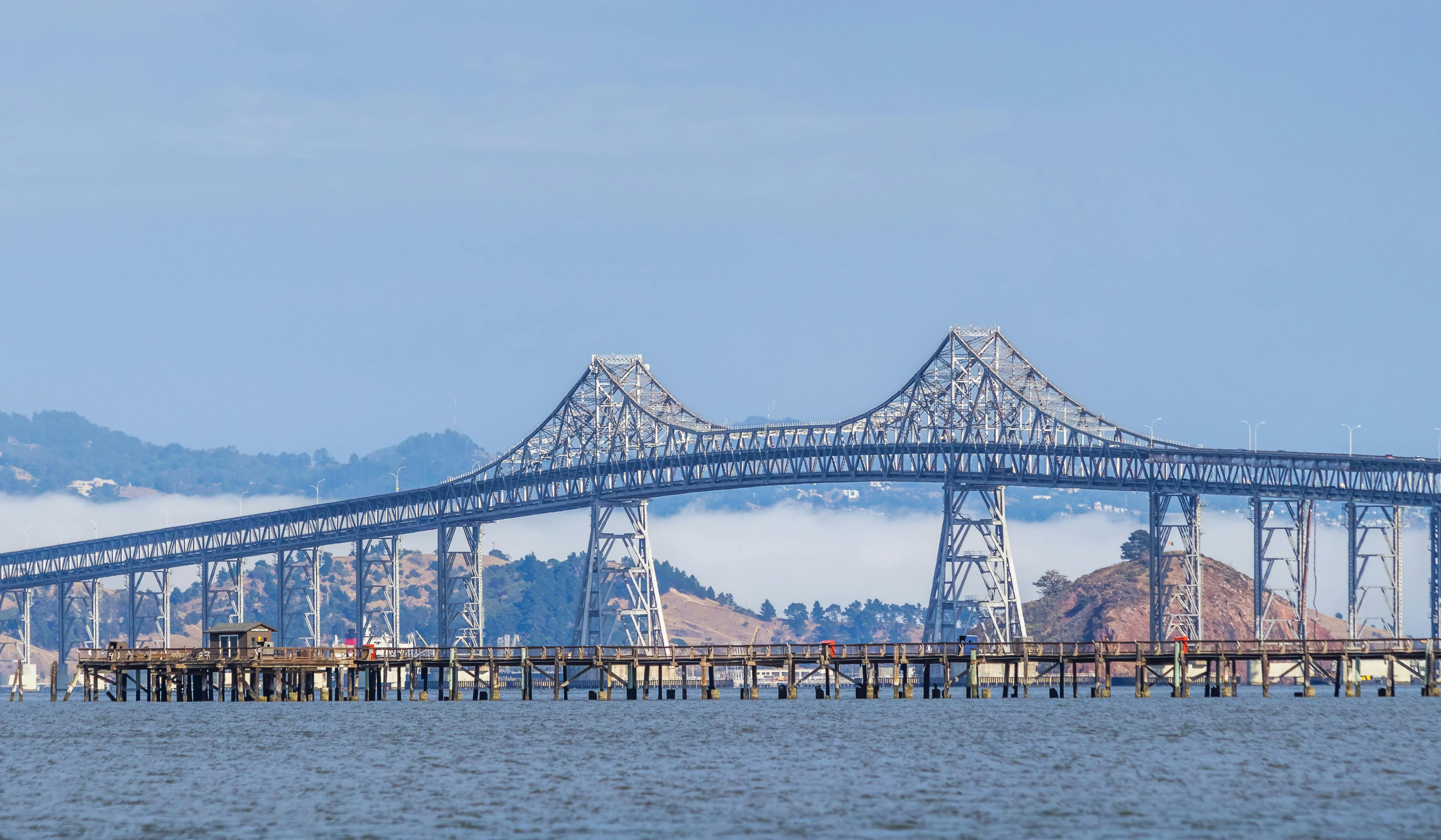 Photo of a Metal Bridge Structure against Gray Sky · Free Stock Photo