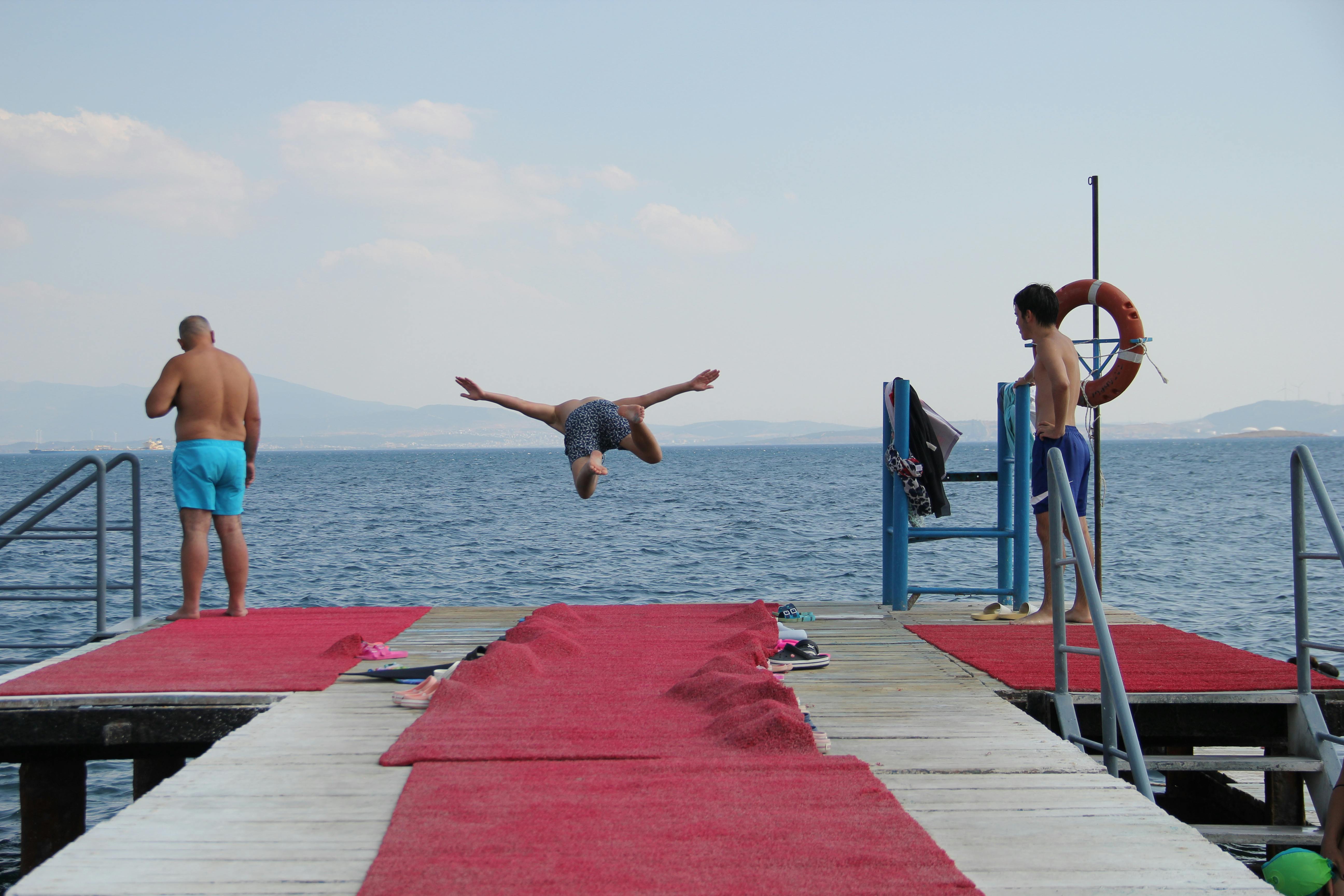 A Person Diving into Water · Free Stock Photo