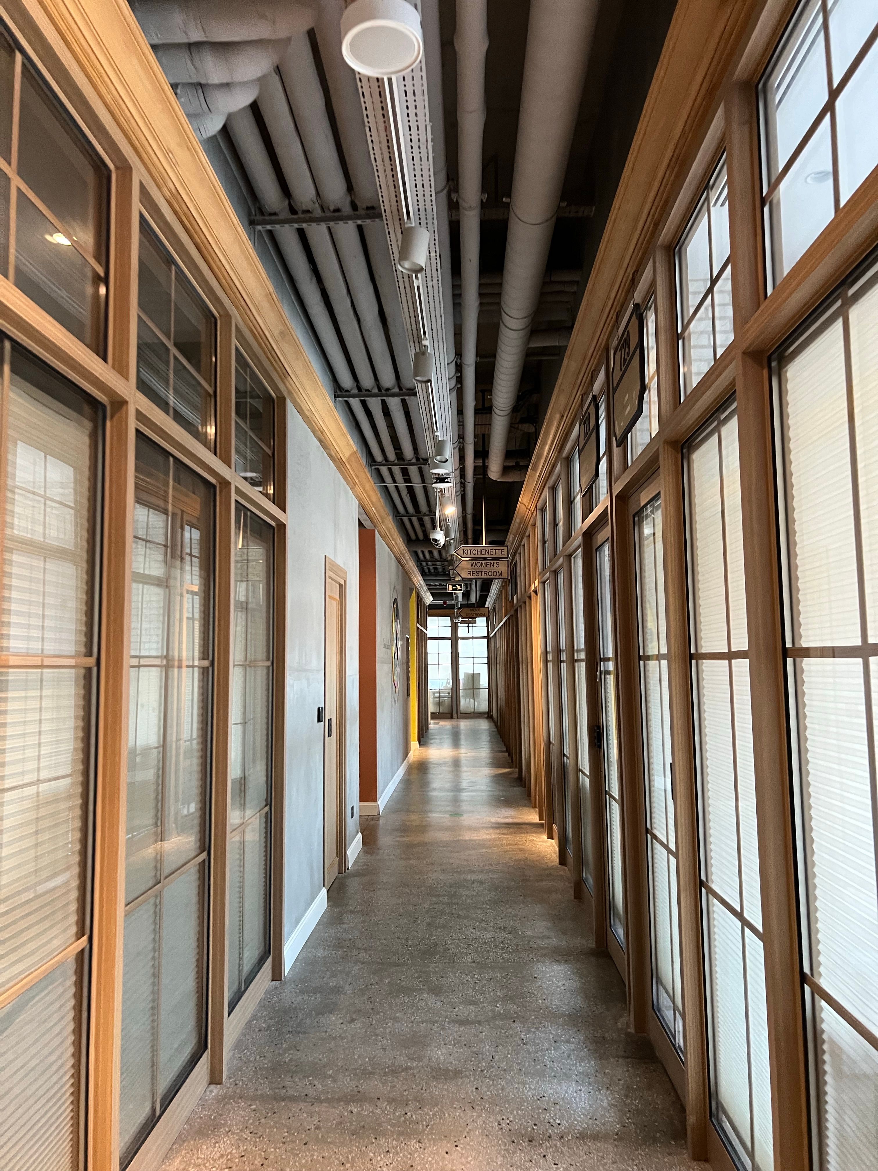 Corridor with Wooden Window Frames in Perspective · Free Stock Photo
