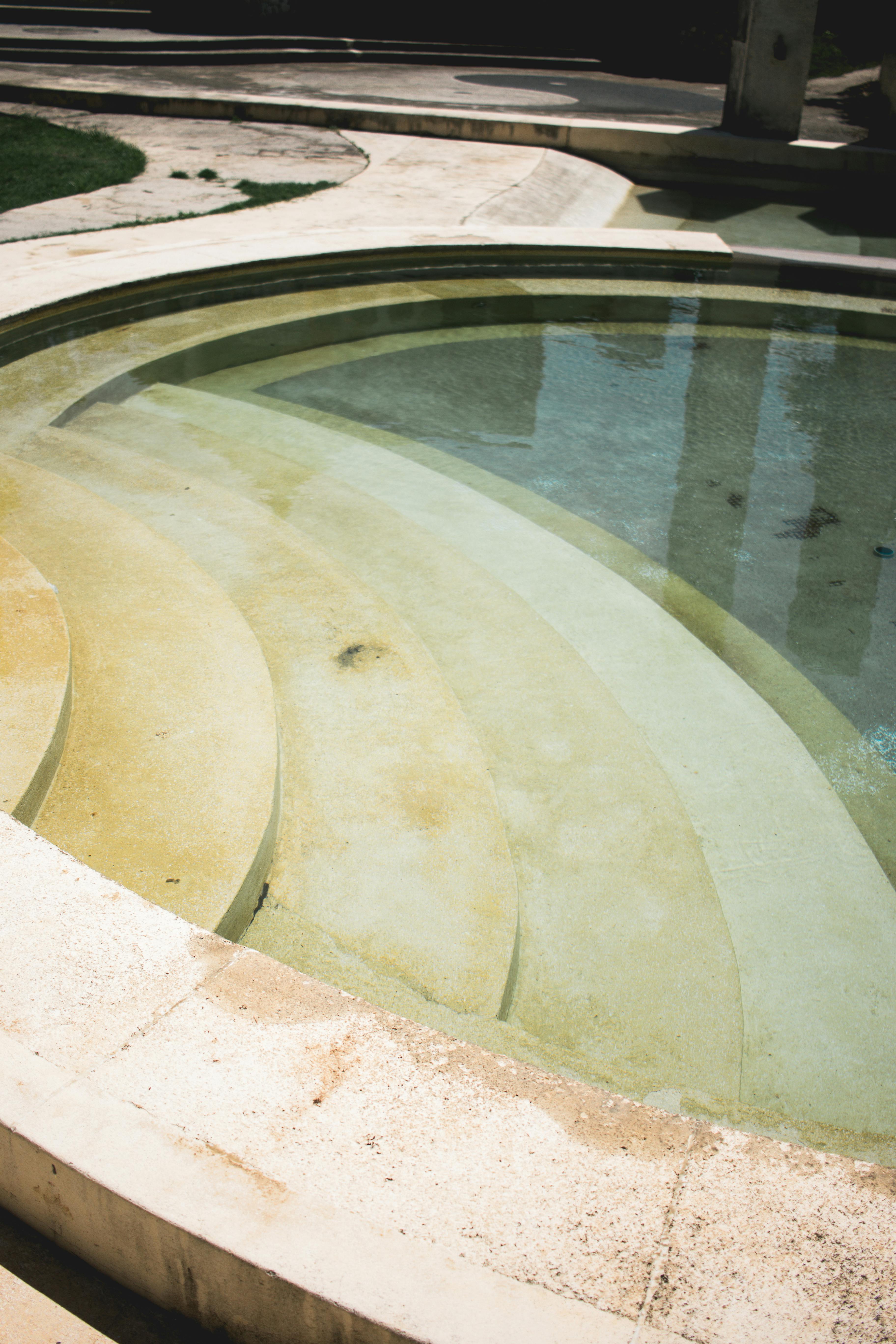 Steps of a Dug-Out Pool · Free Stock Photo