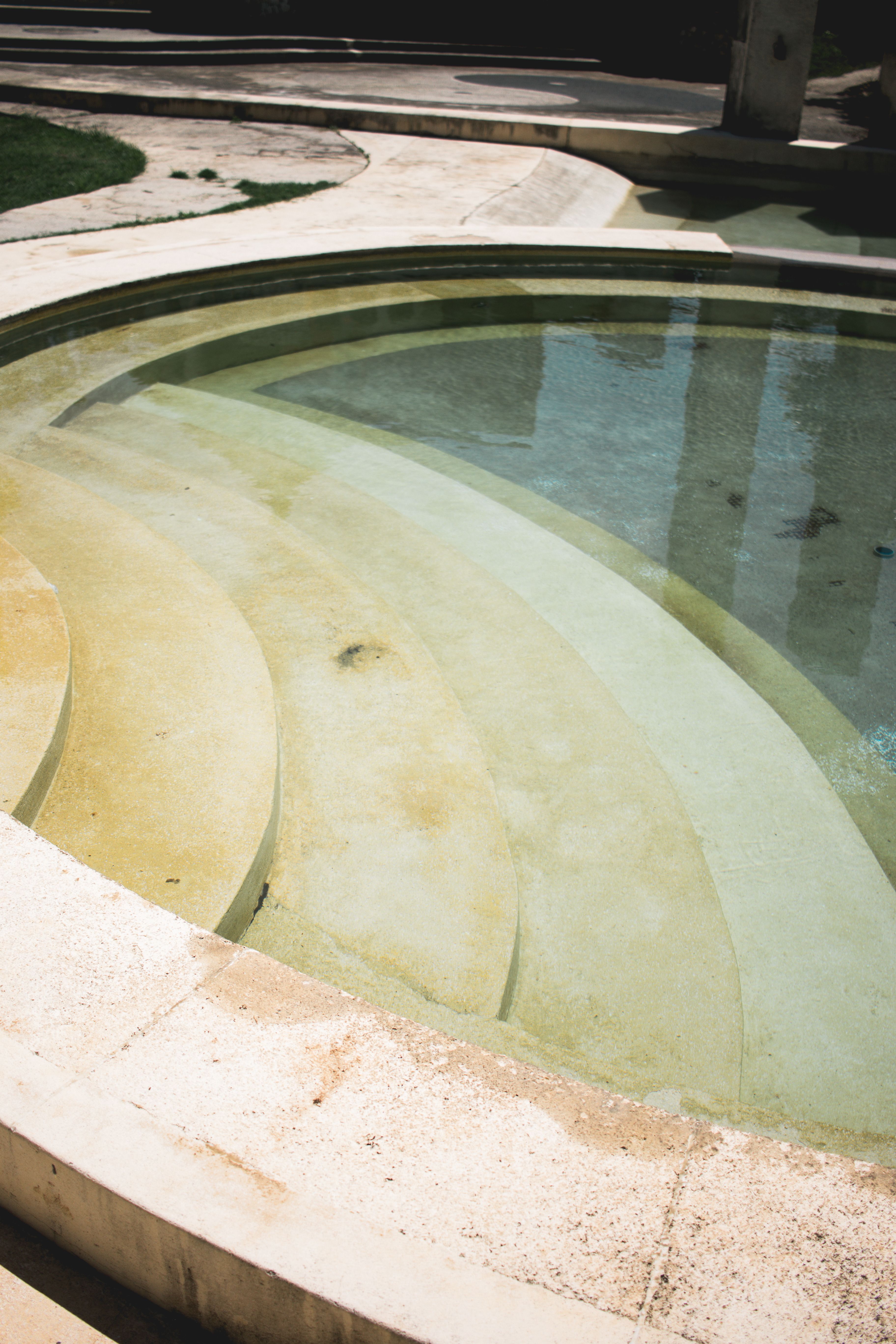 Steps of a Dug-Out Pool · Free Stock Photo