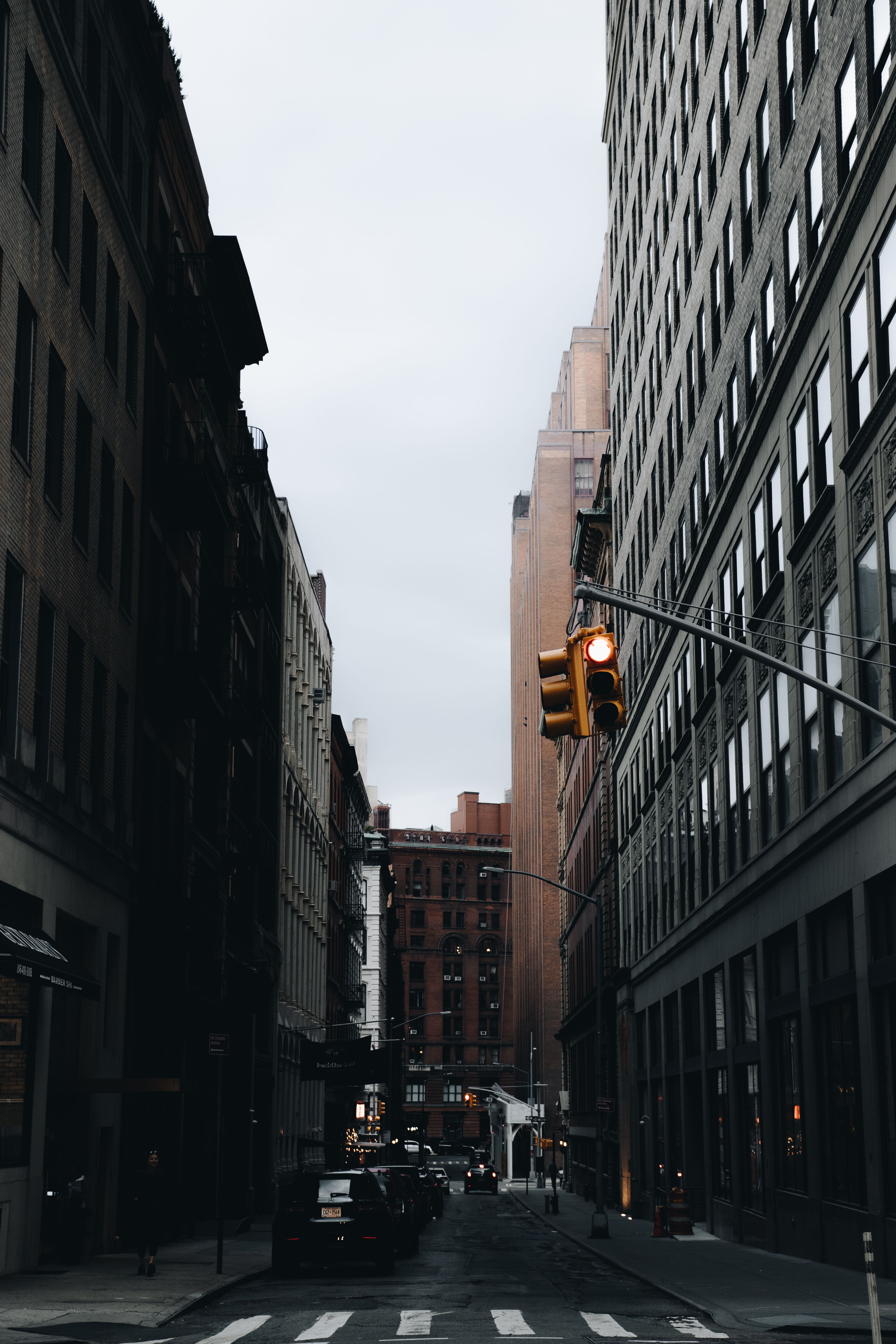 Yellow Traffic Light with Red Light Above the Street of New York City ...