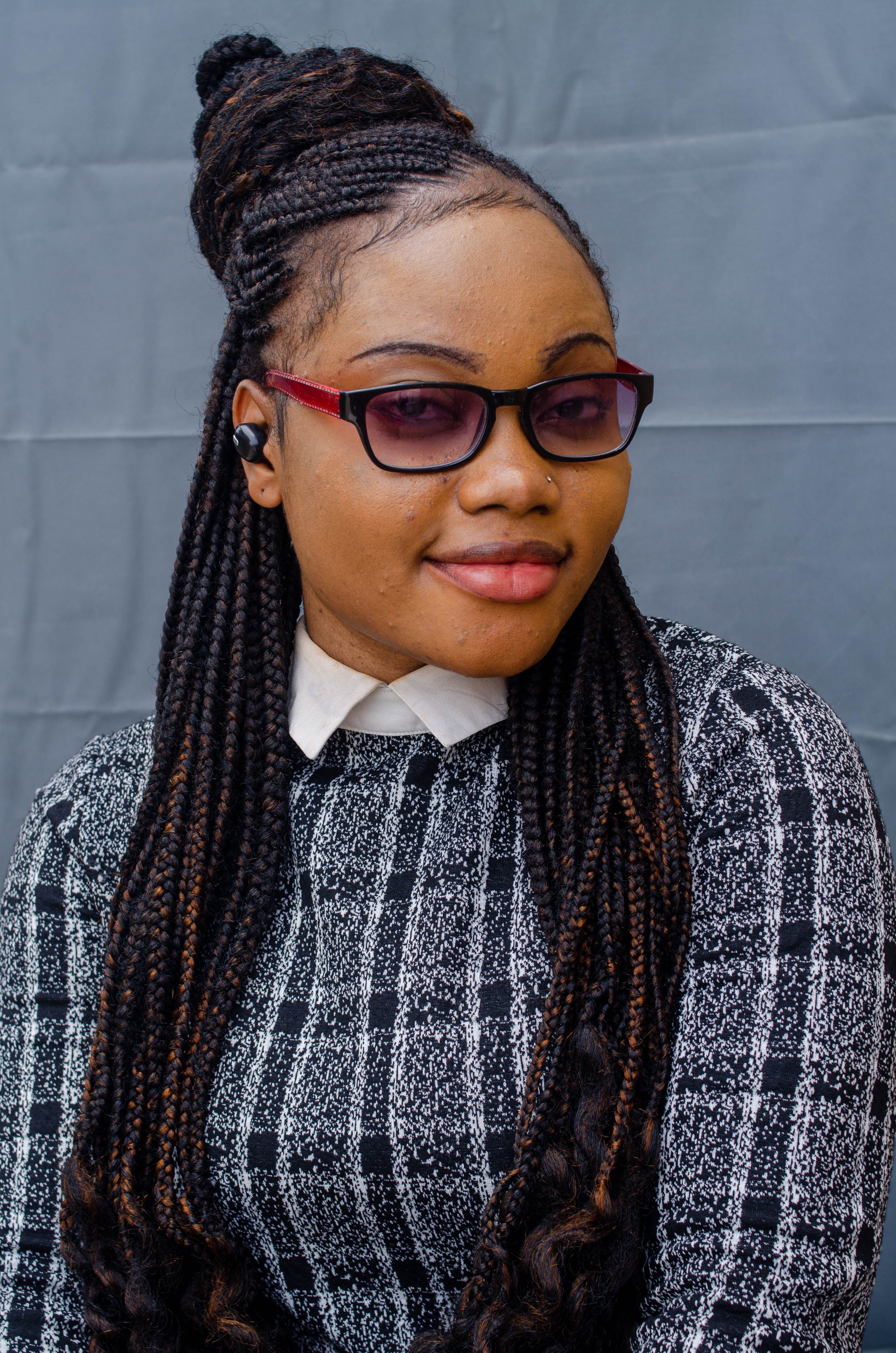 Portrait of Young Woman with Dreadlocks in Glasses · Free Stock Photo