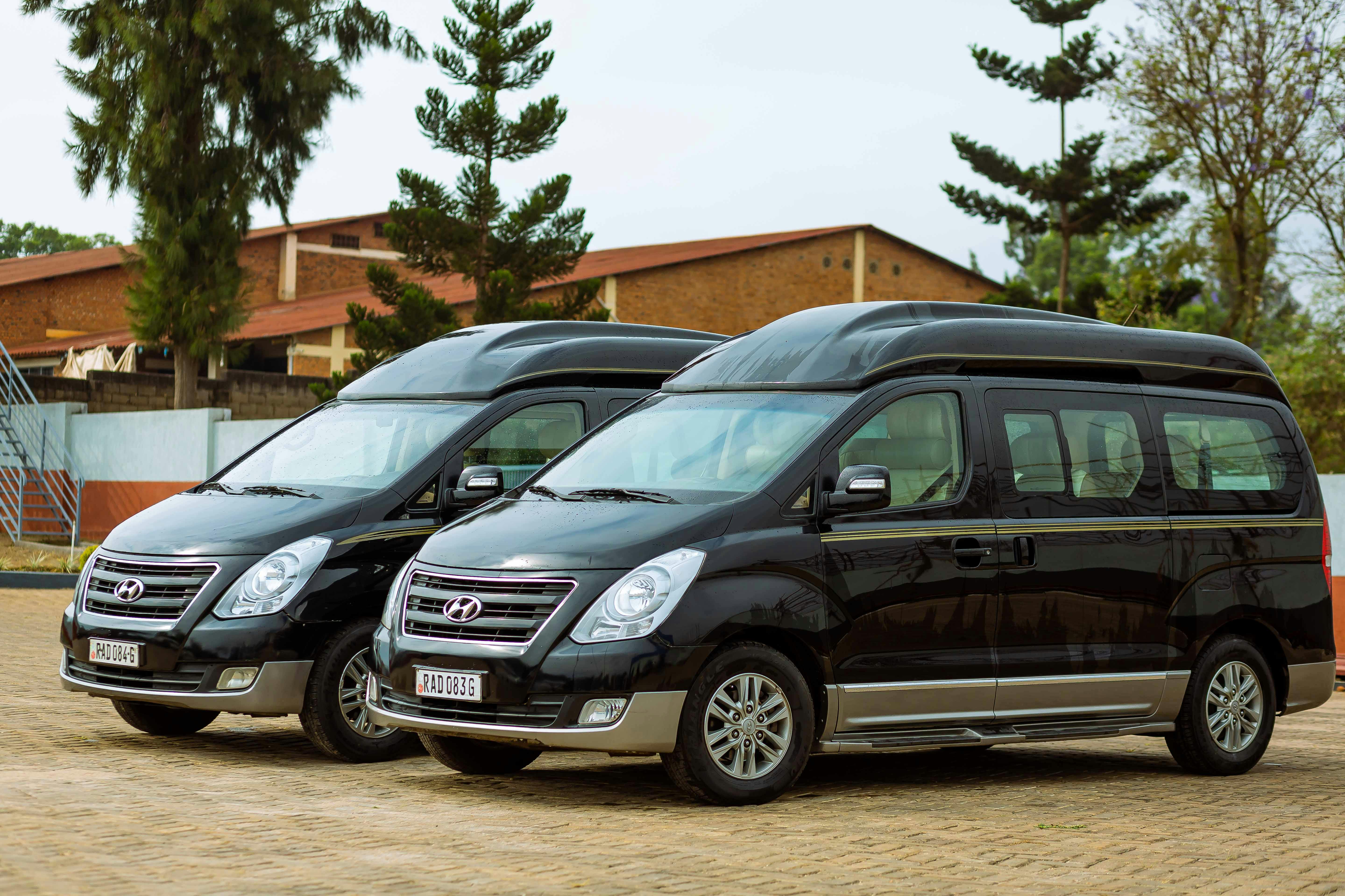 Two Parked Black Vans · Free Stock Photo