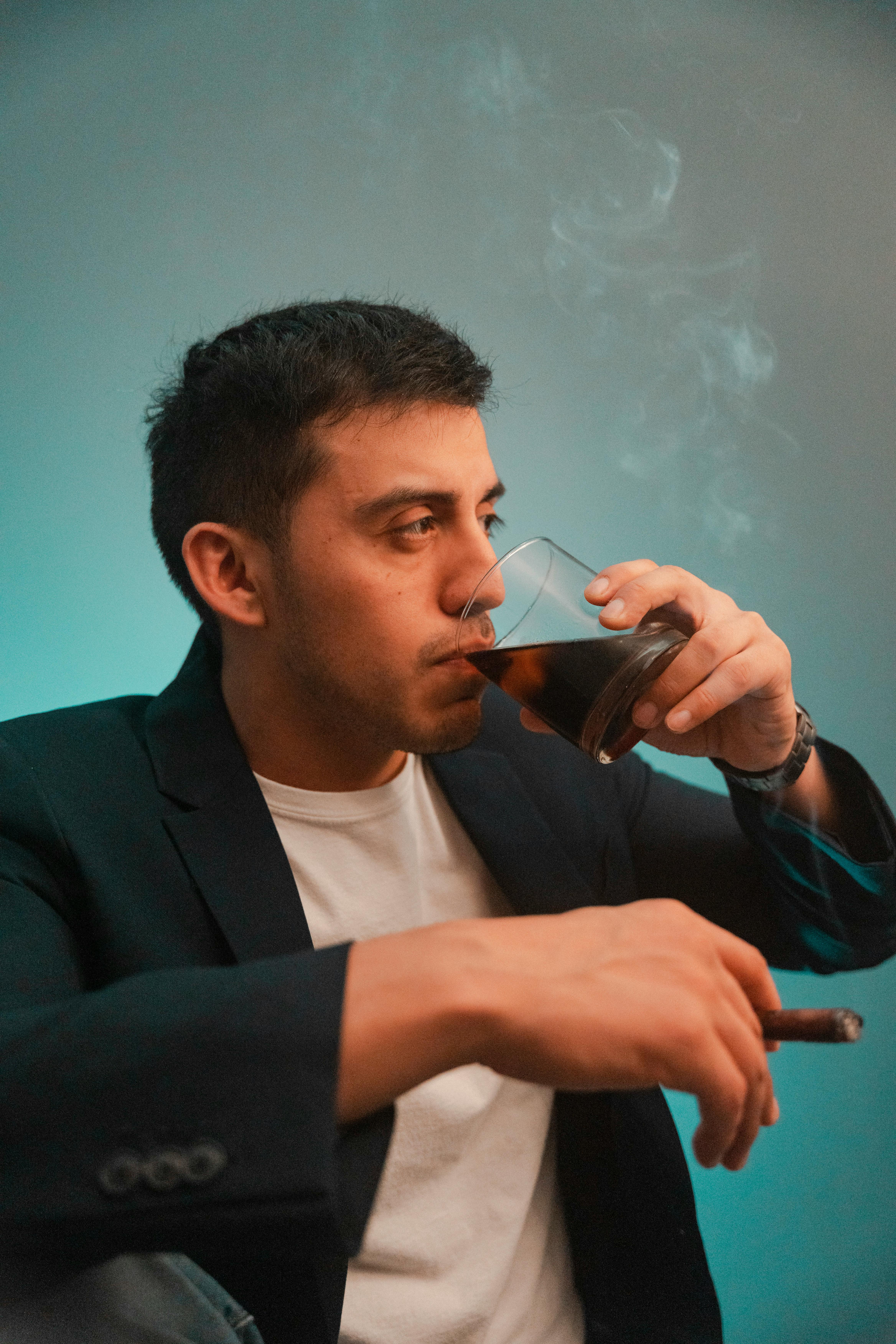 Man Drinking Cola with Ice Cubes · Free Stock Photo