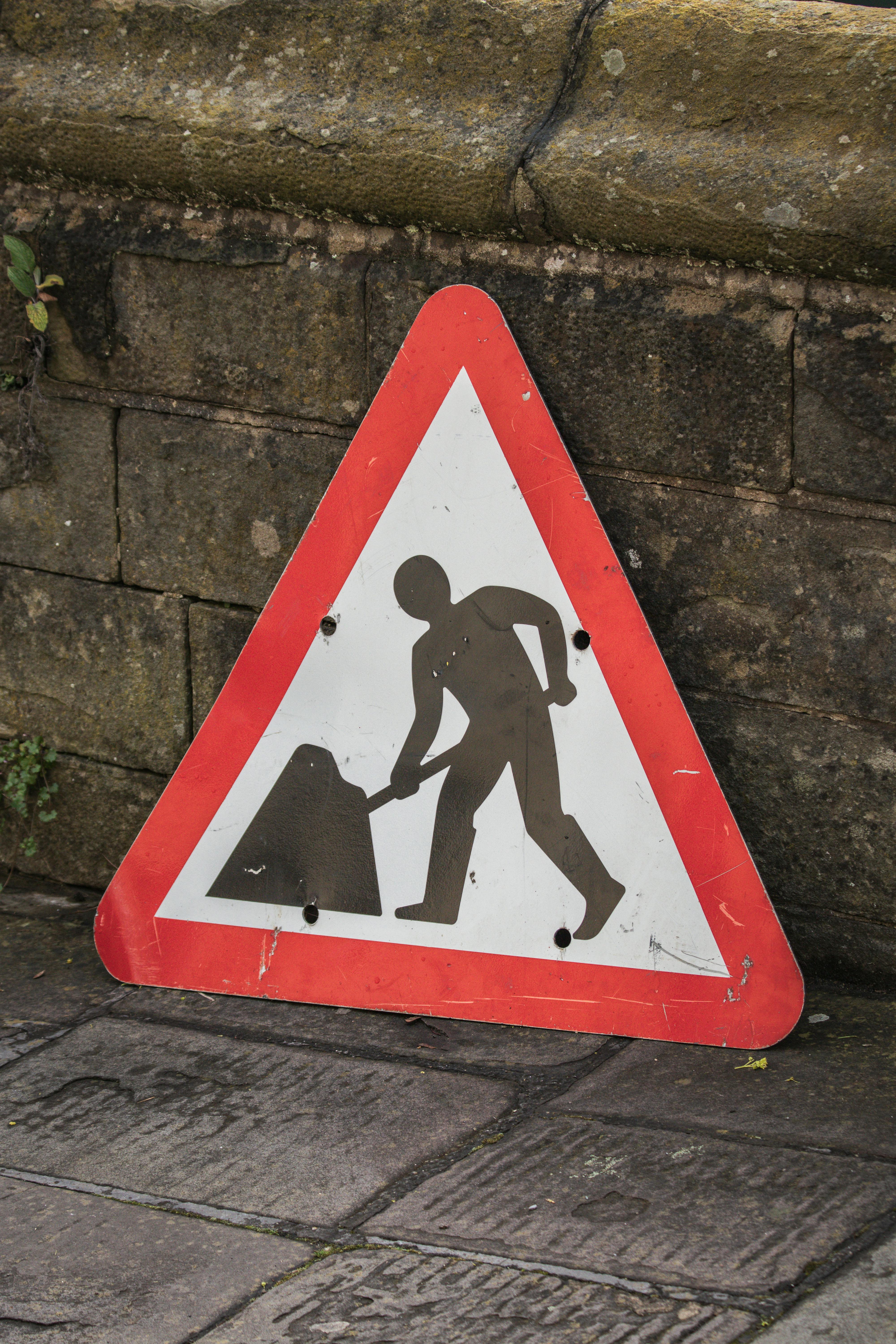 Roadwork Warning Sign on Street · Free Stock Photo