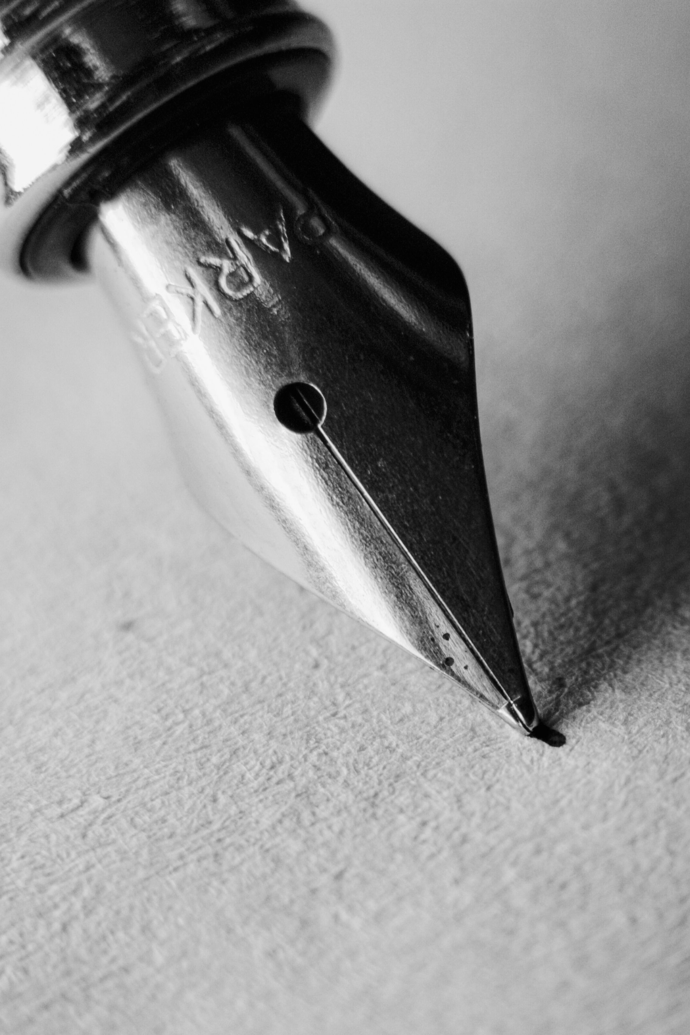 Person dipping Quill Pen in an Ink · Free Stock Photo