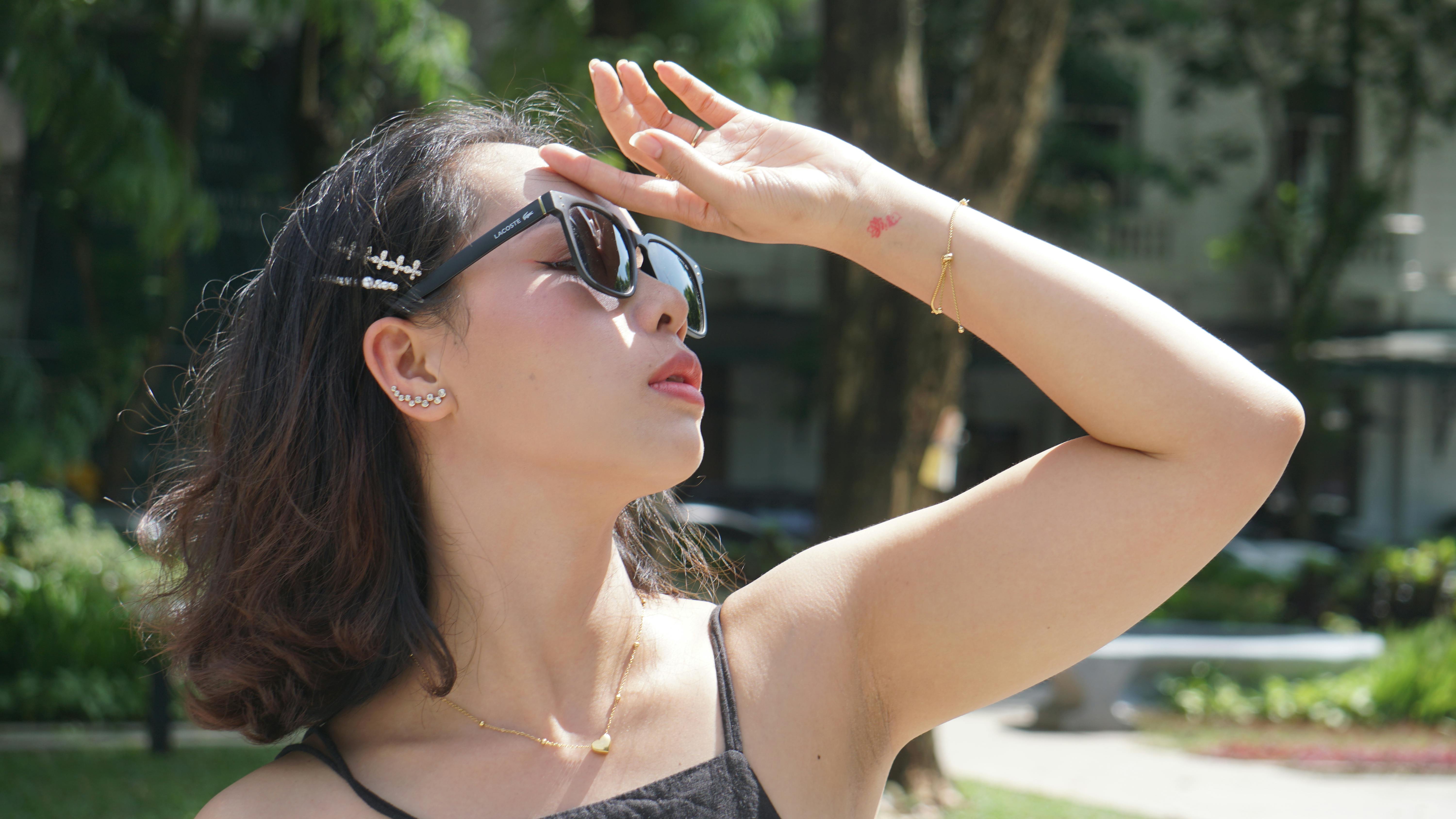 Woman Posing in Sunlight · Free Stock Photo