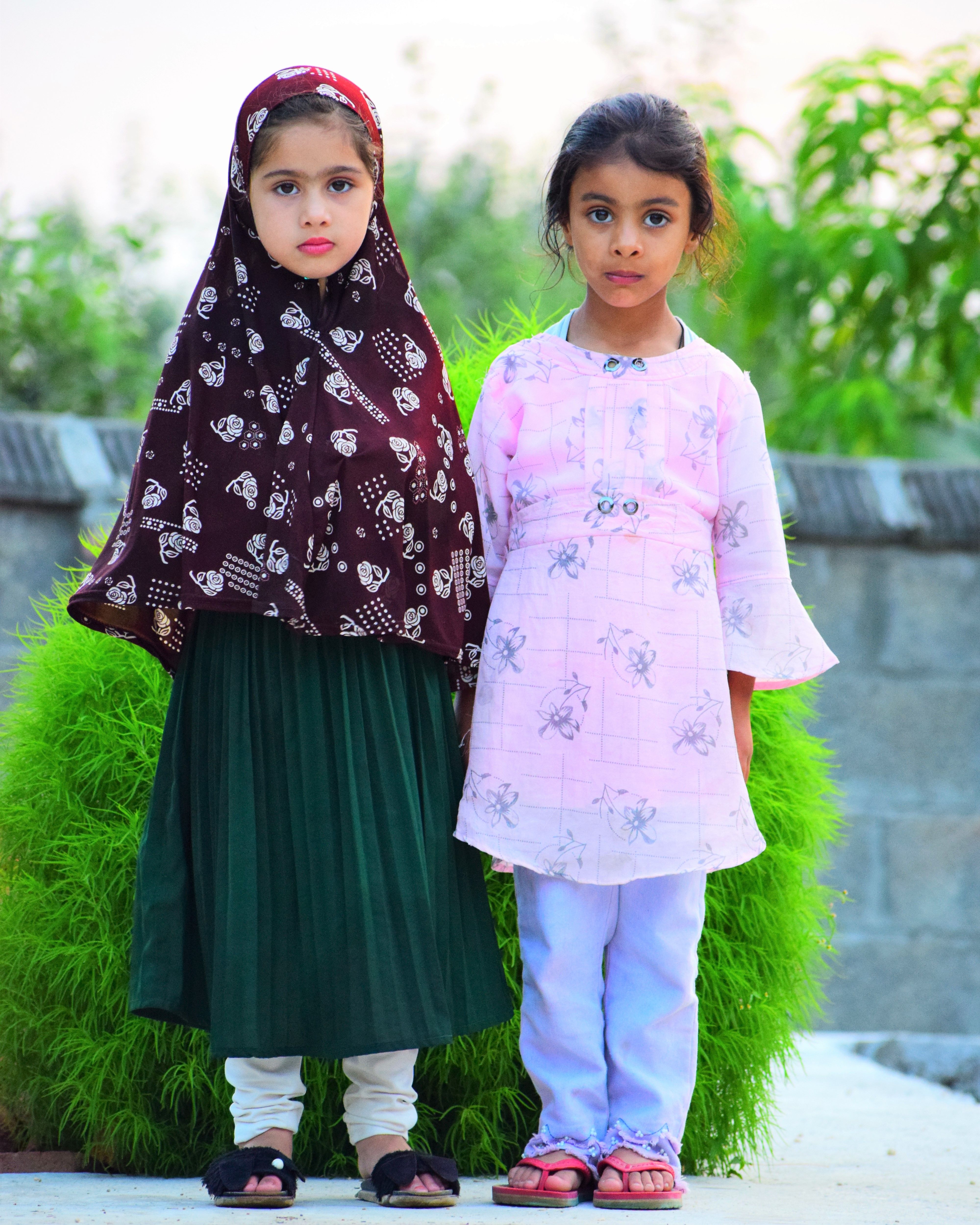 Two Little Girls in Traditional Clothing Standing Outside · Free Stock ...