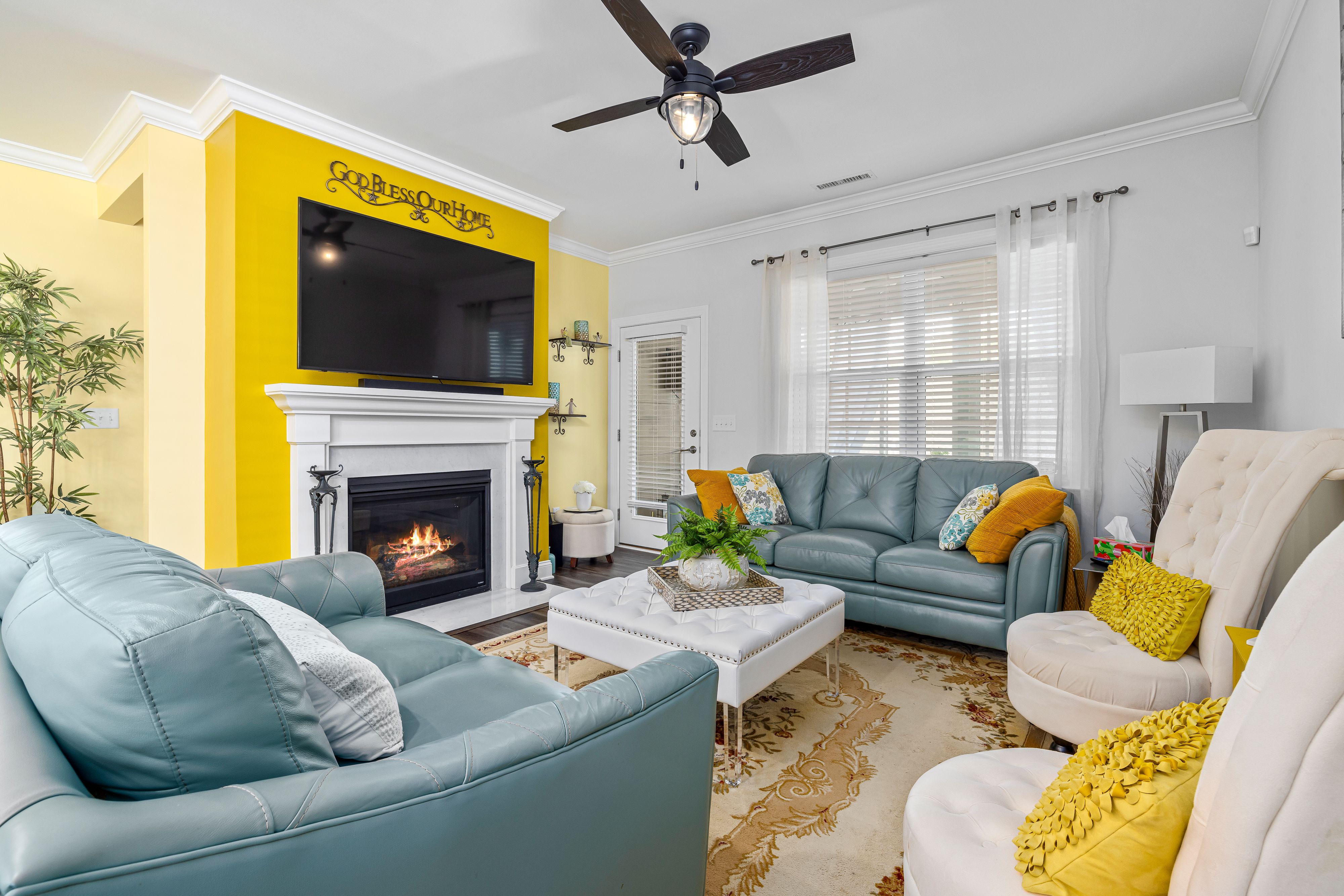 Hotel Interior With Large Fireplace in Center · Free Stock Photo