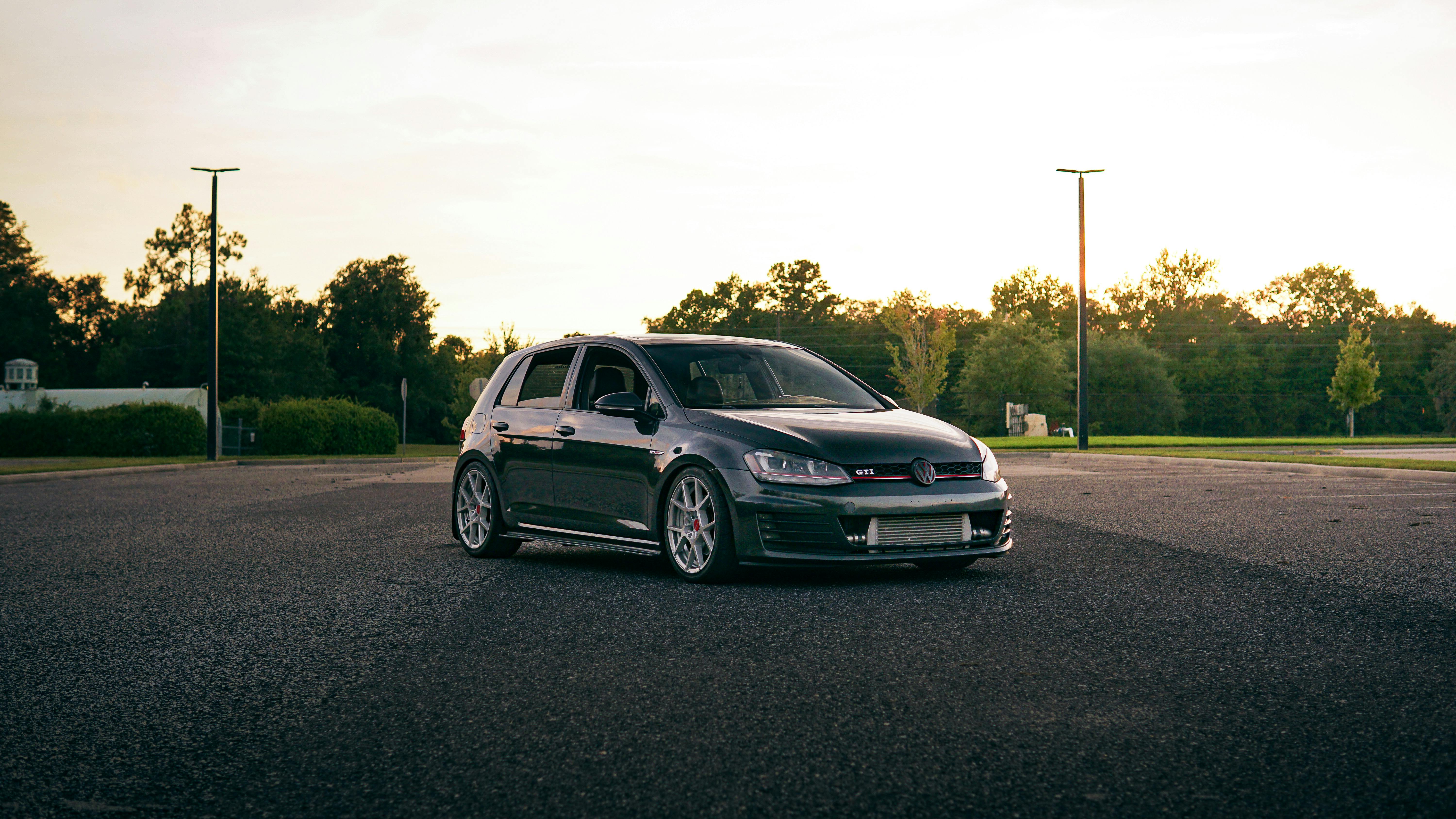 Black Volkswagen Golf GTI on Road · Free Stock Photo