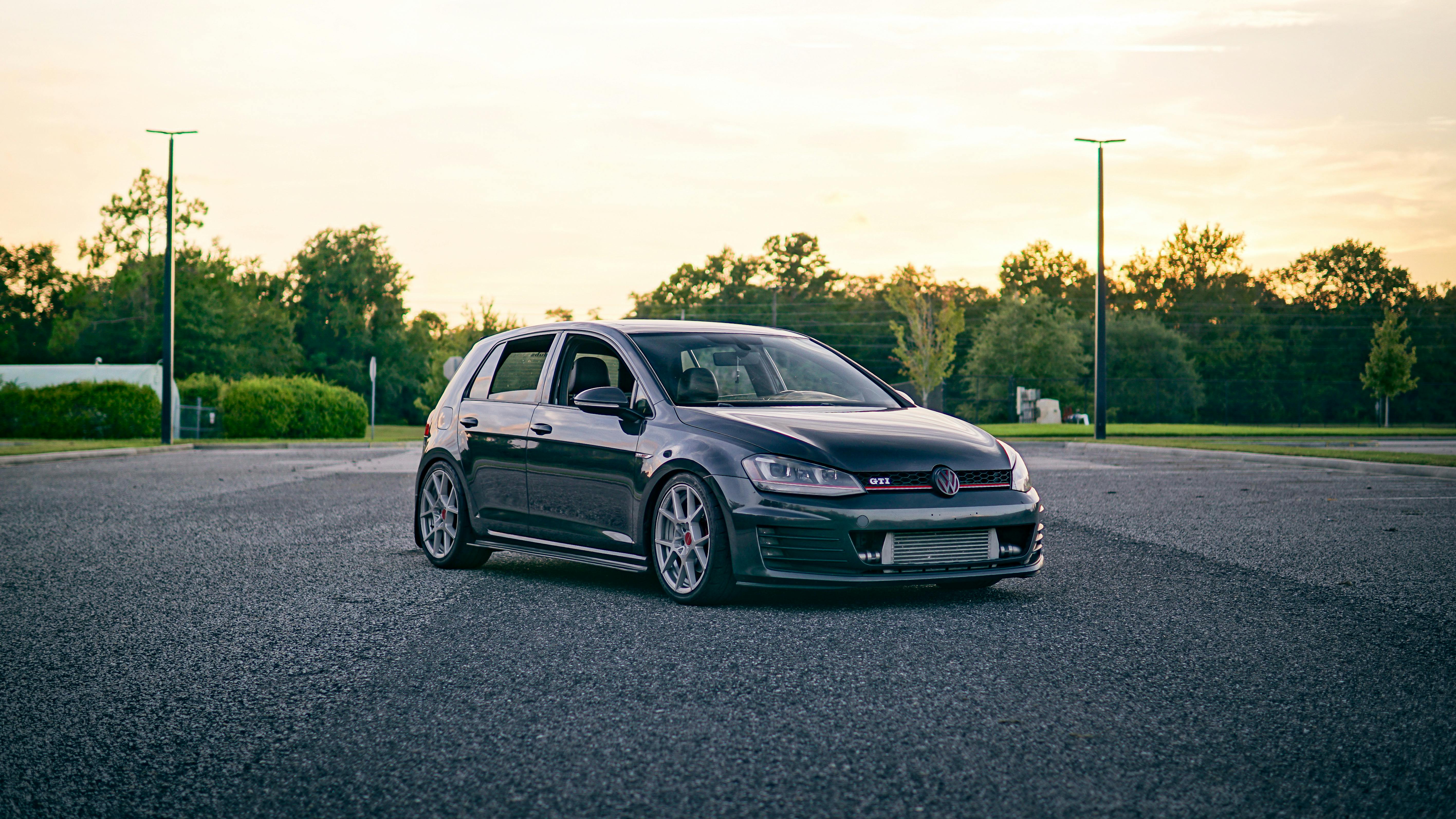 Black Volkswagen GTI Golf on Parking Spot · Free Stock Photo