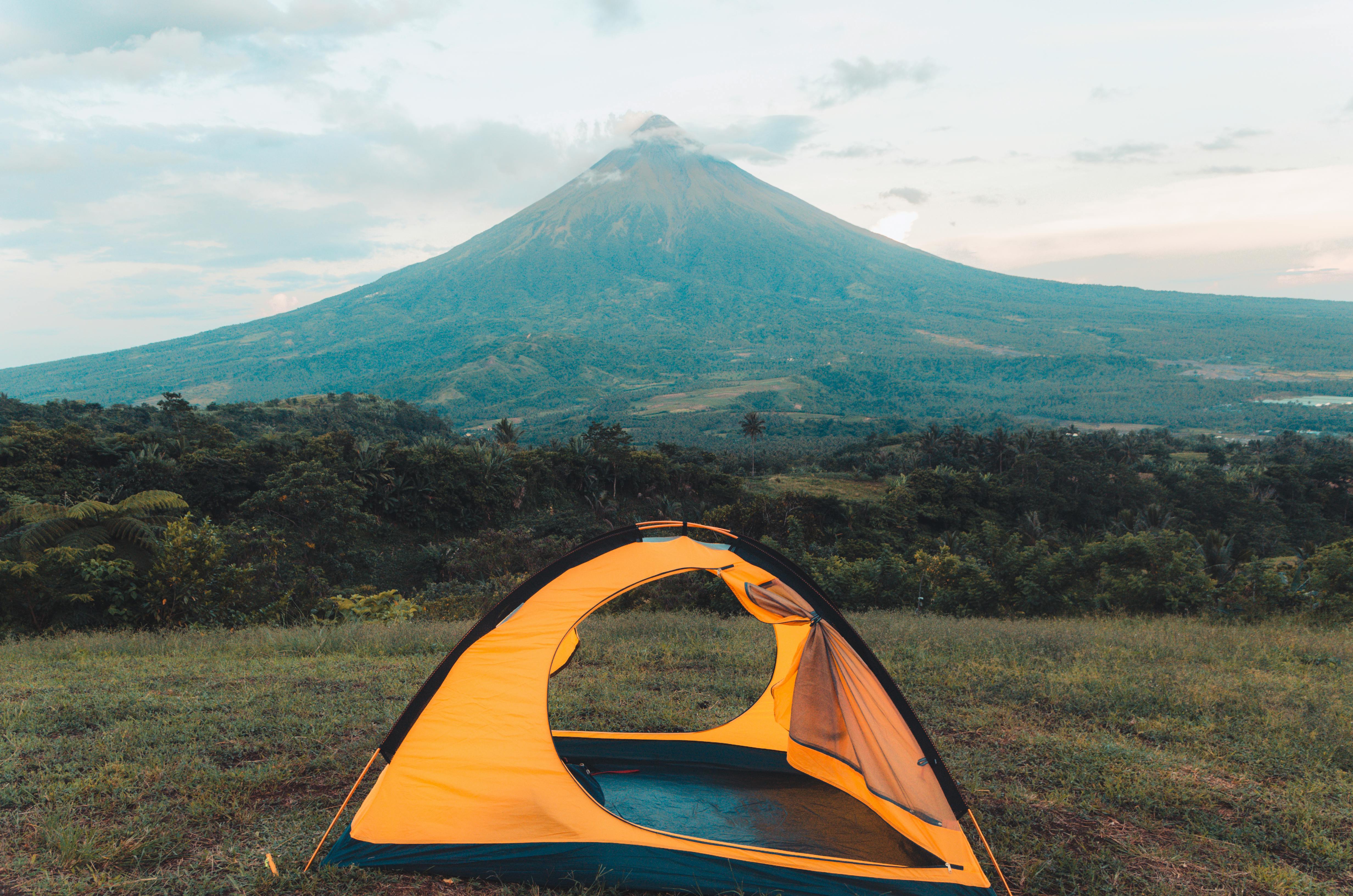 Tent with Volcano behind · Free Stock Photo