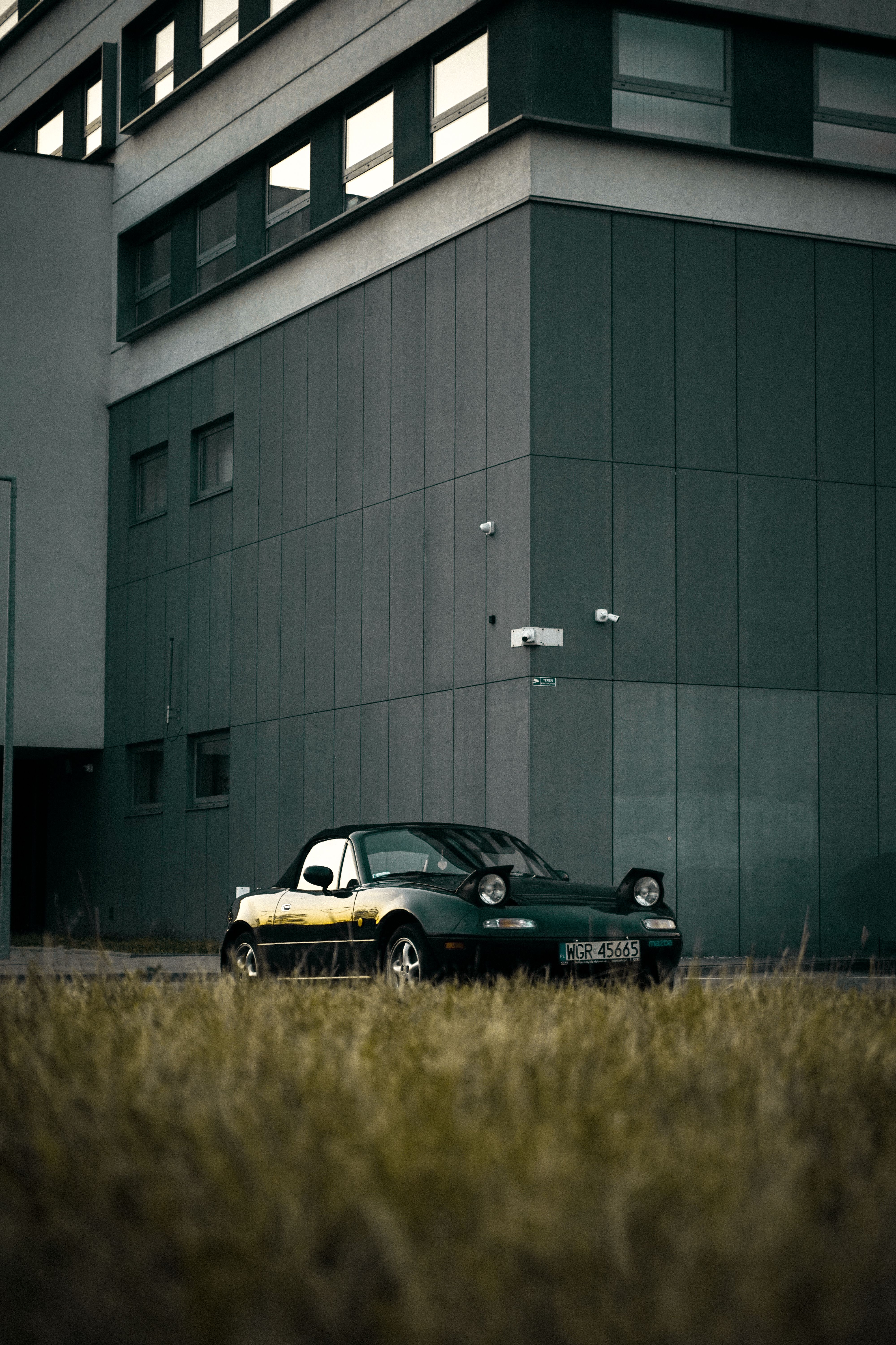 Black Car in Front of a Building · Free Stock Photo