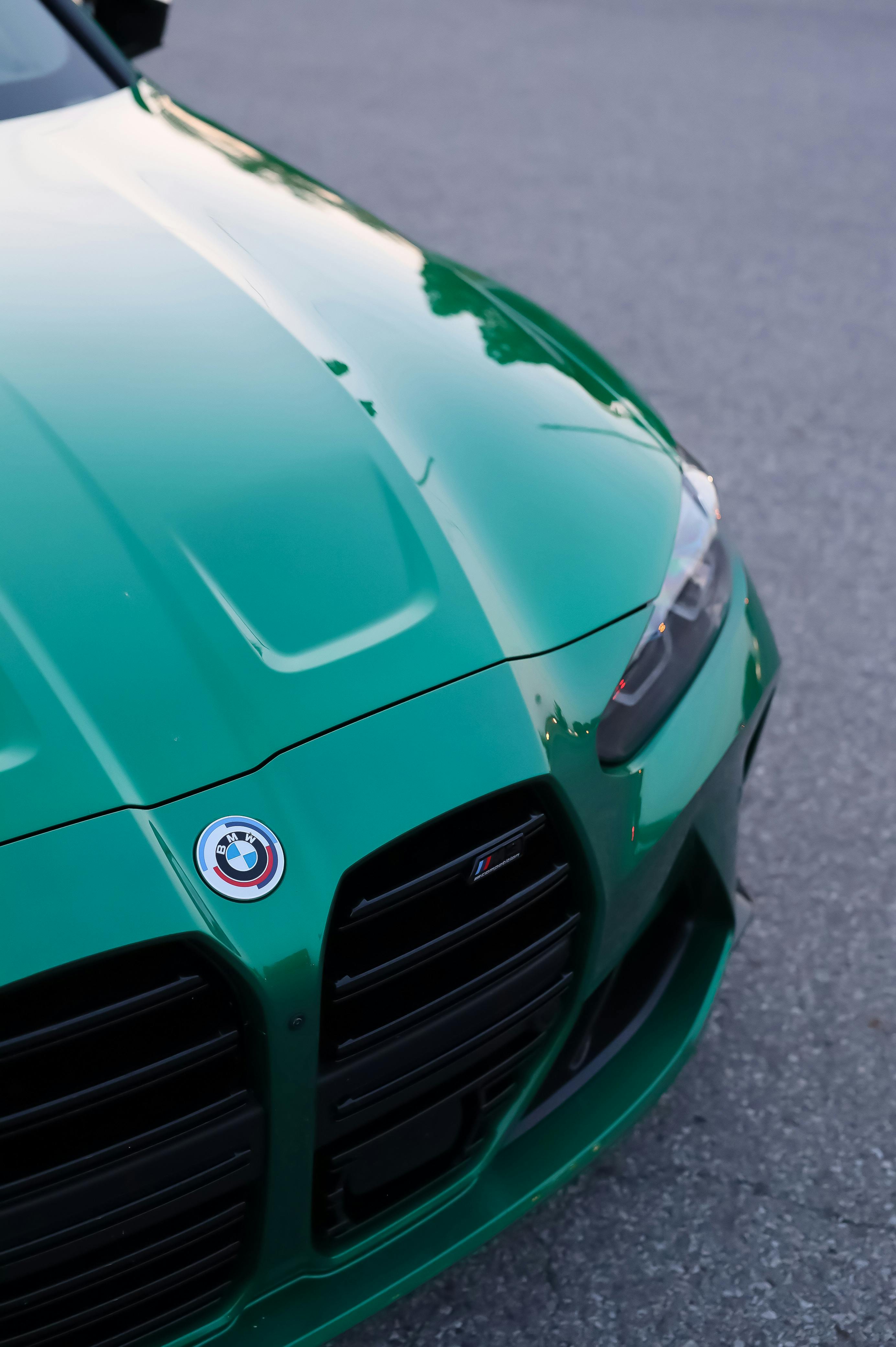 Bonnet of Green BMW · Free Stock Photo