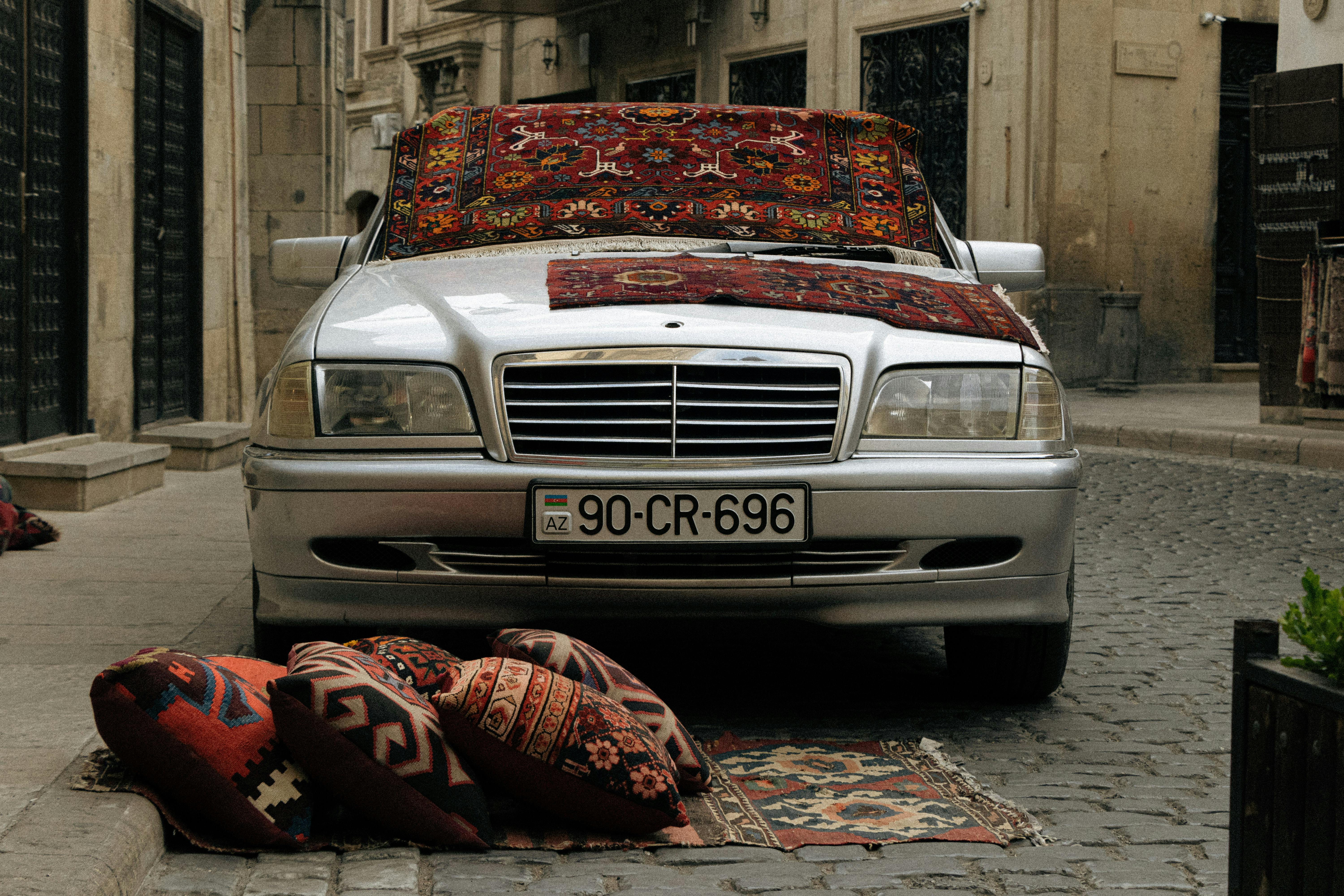 Carpet Stall on Mercedes-Benz · Free Stock Photo