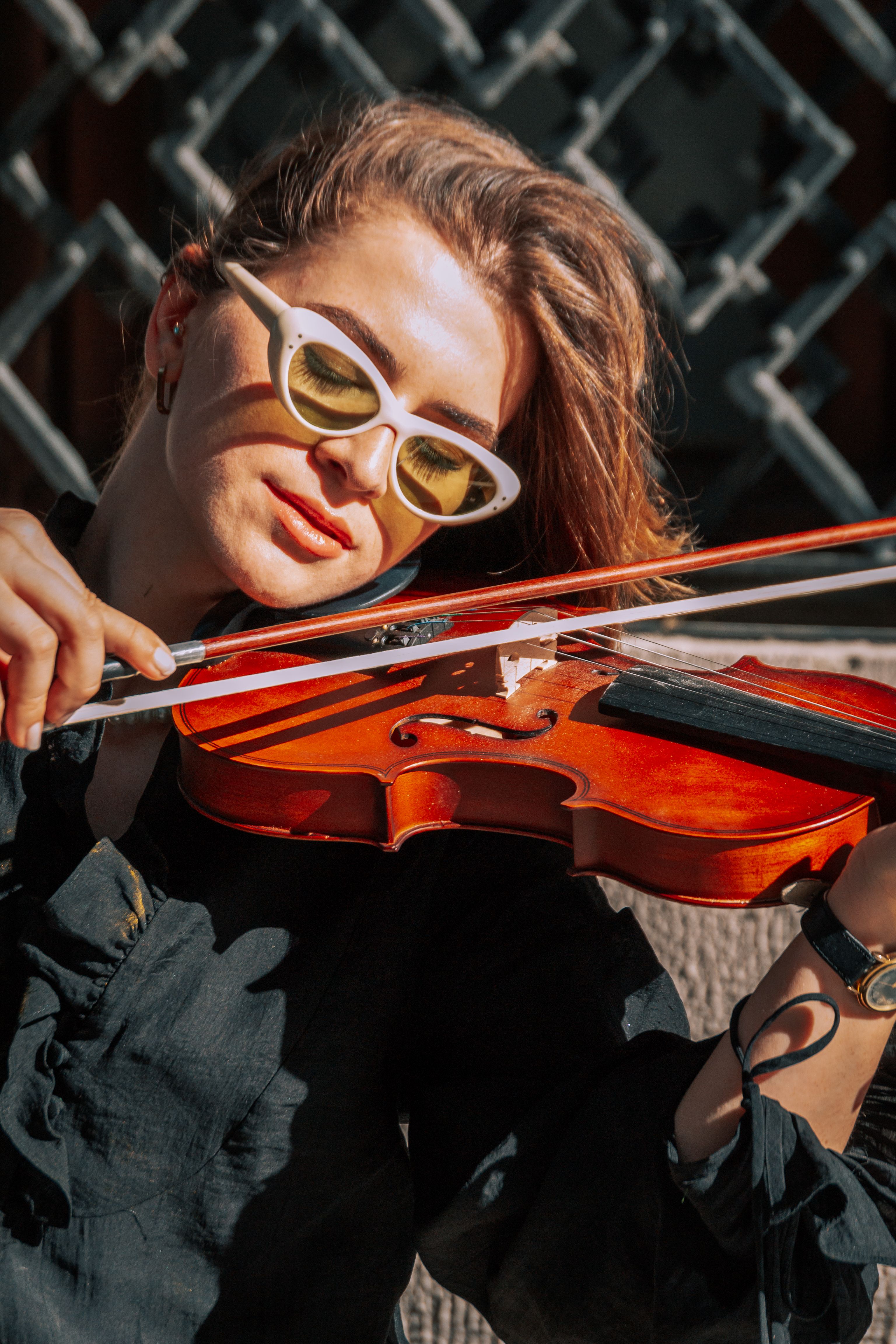 Woman in Red Dress Playing Cello · Free Stock Photo