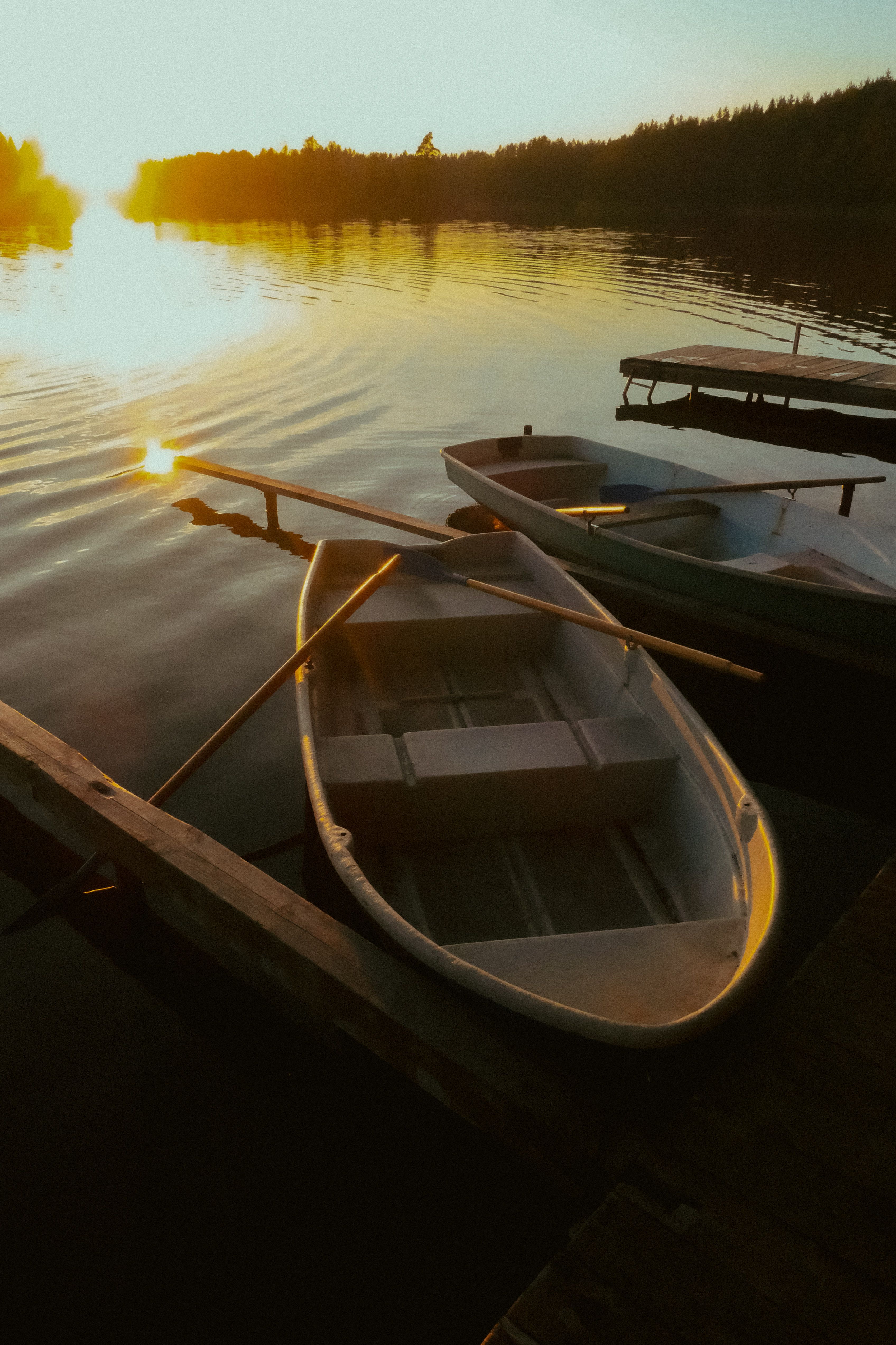 Empty Boats on Lake at Sunset · Free Stock Photo