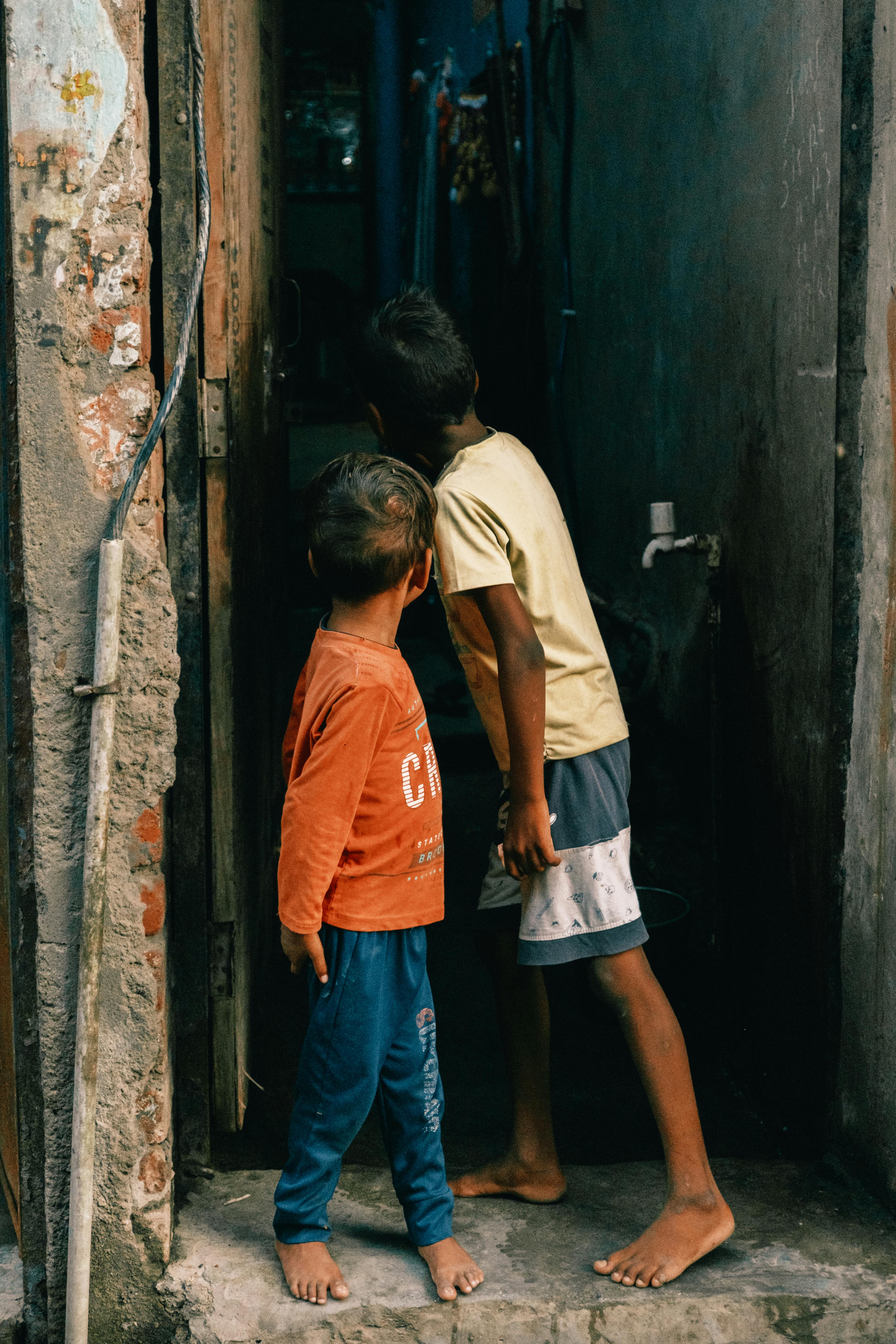 Little Boys Lurking Behind the Doors · Free Stock Photo