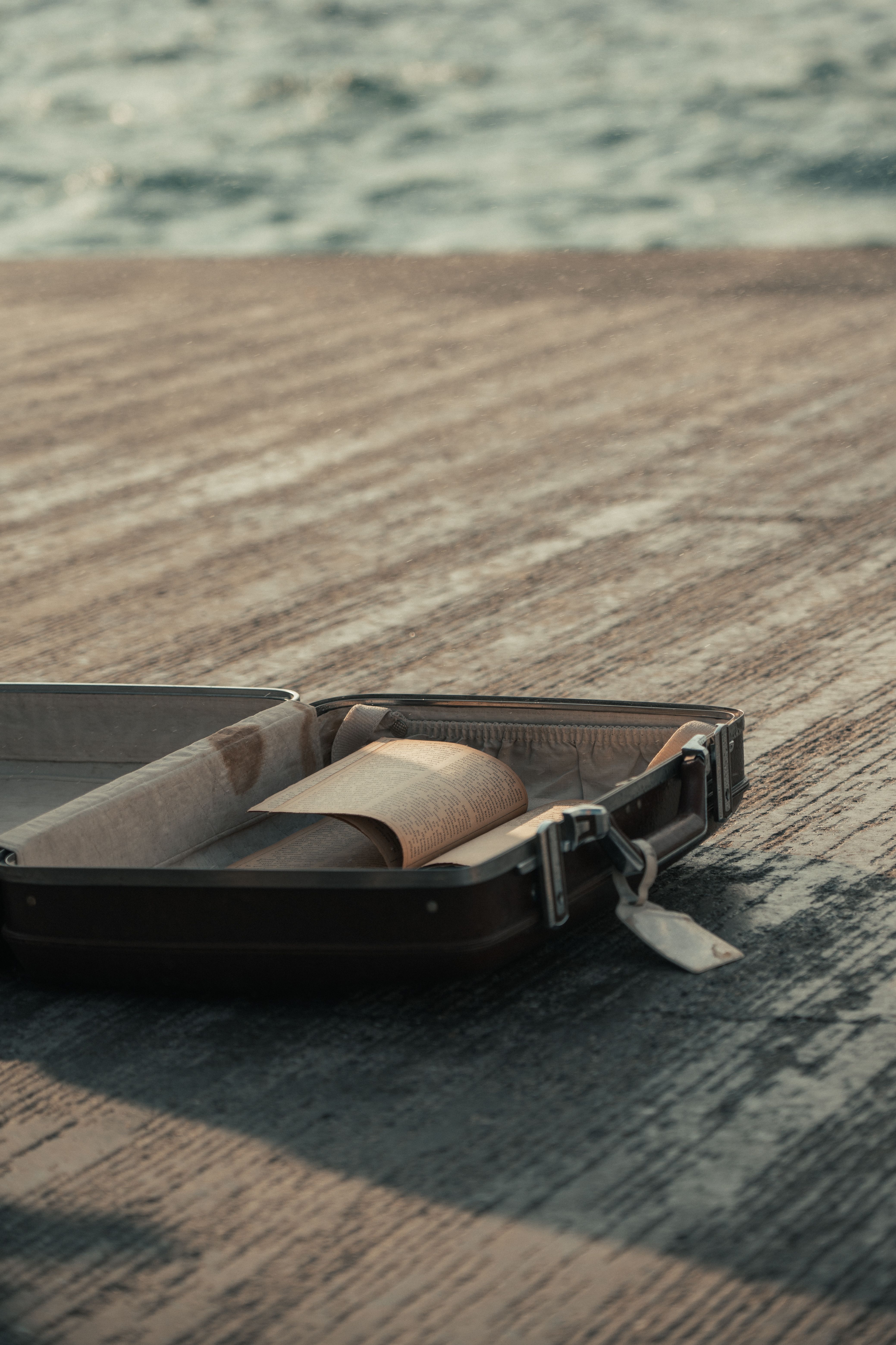 Book in Open Suitcase · Free Stock Photo