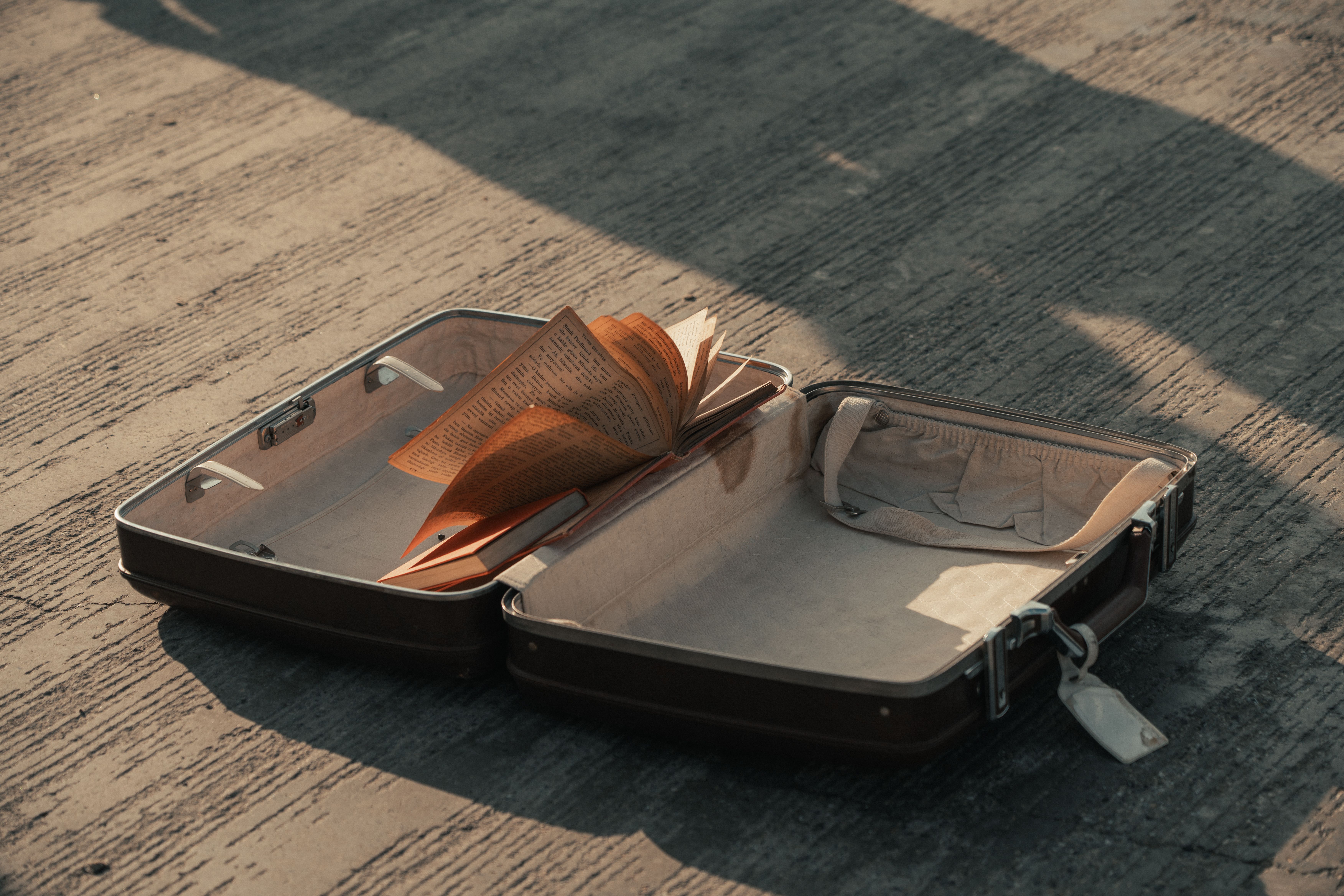 Book in Suitcase · Free Stock Photo