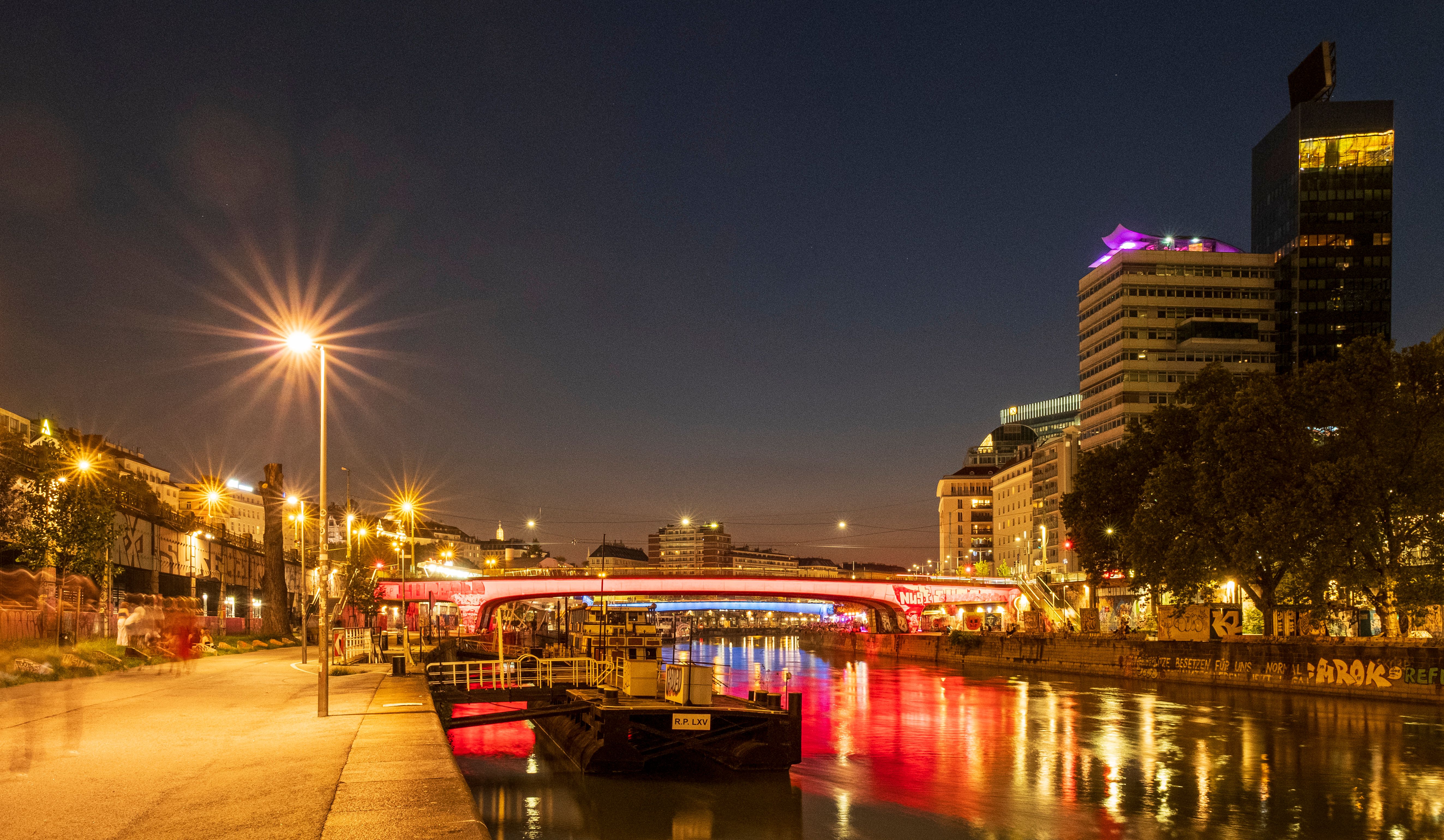 illuminated-donaukanal-in-vienna-at-night-free-stock-photo