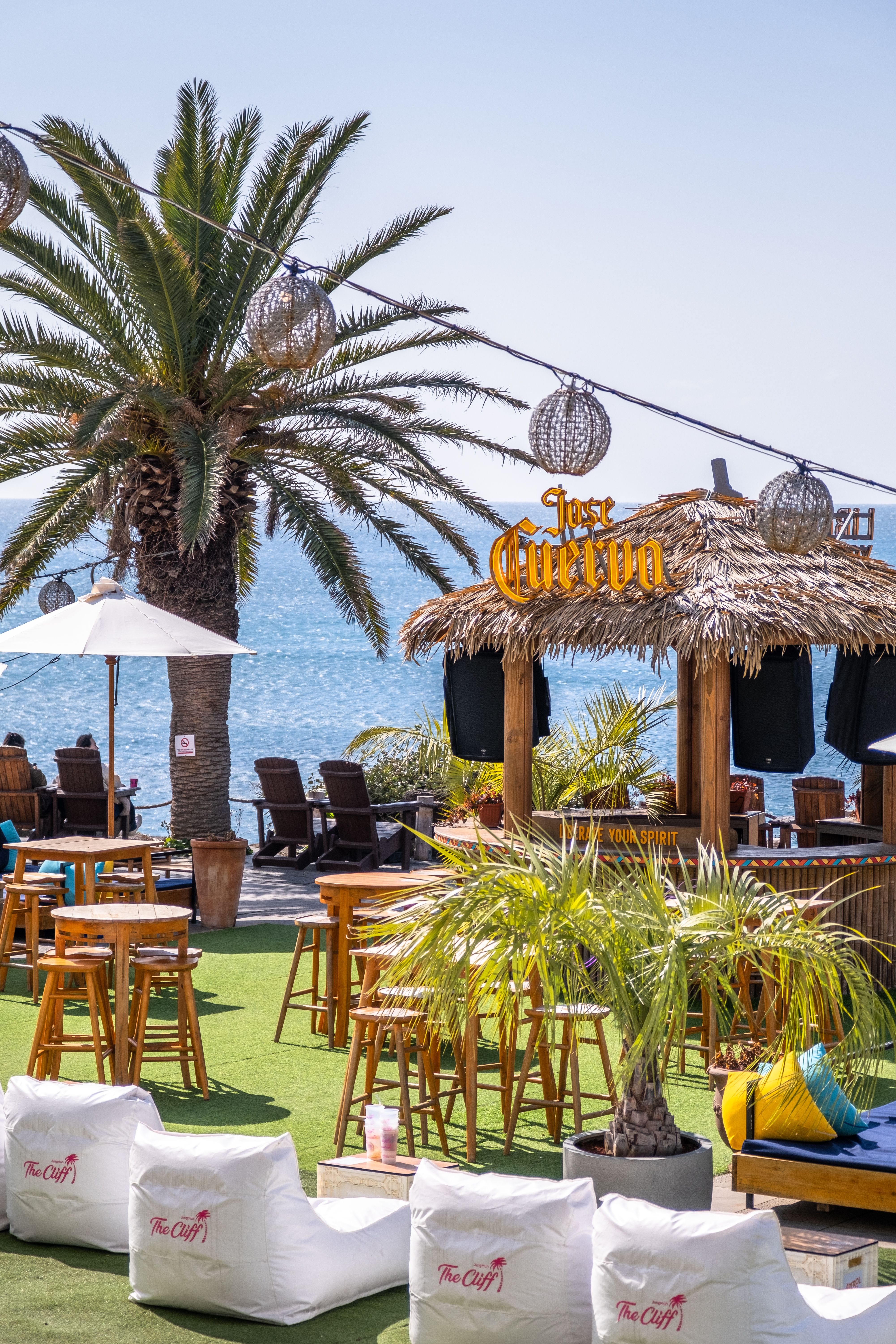Tiki Bar Tables by the Beach · Free Stock Photo
