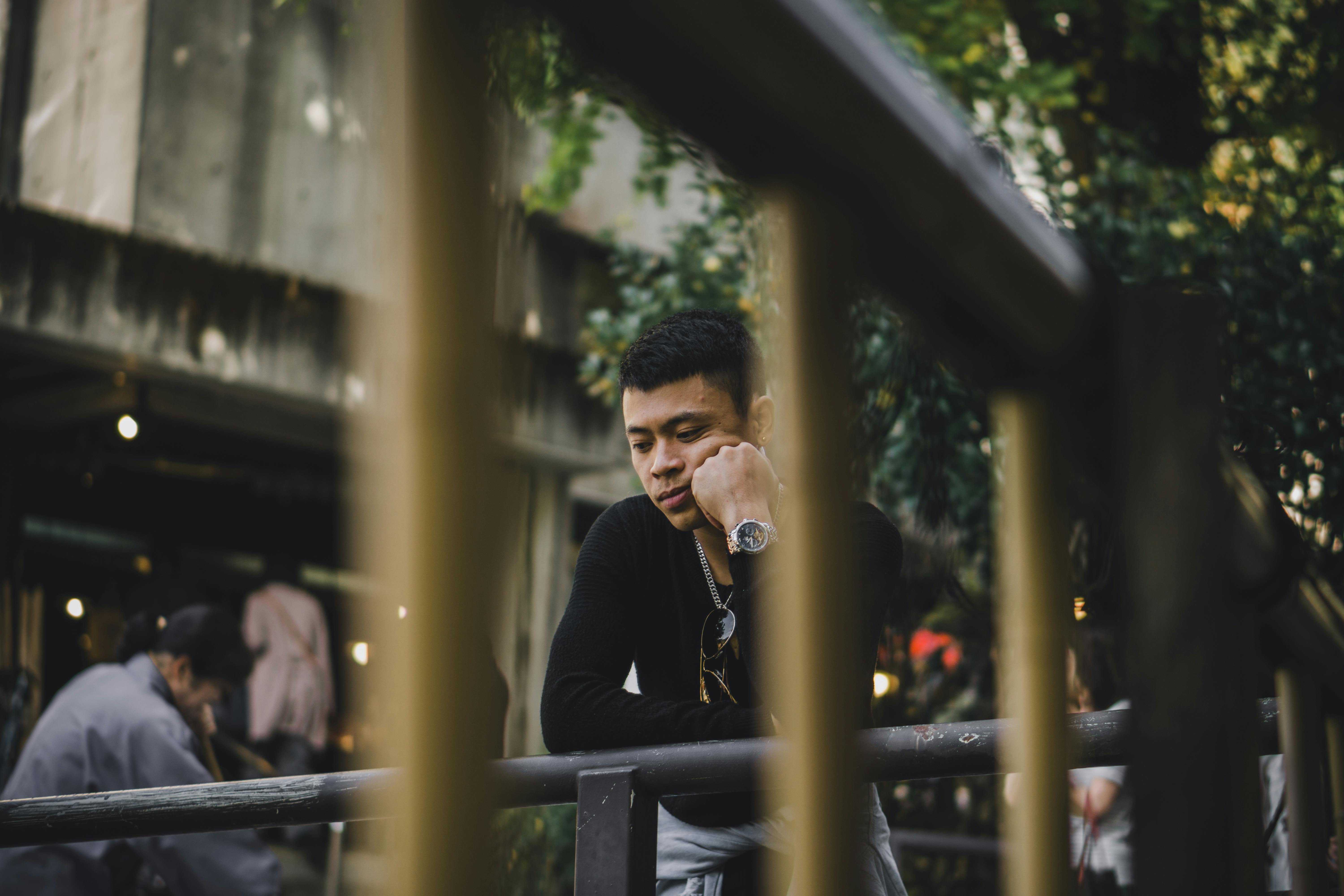 Man Standing on Stair Case Looking Up · Free Stock Photo