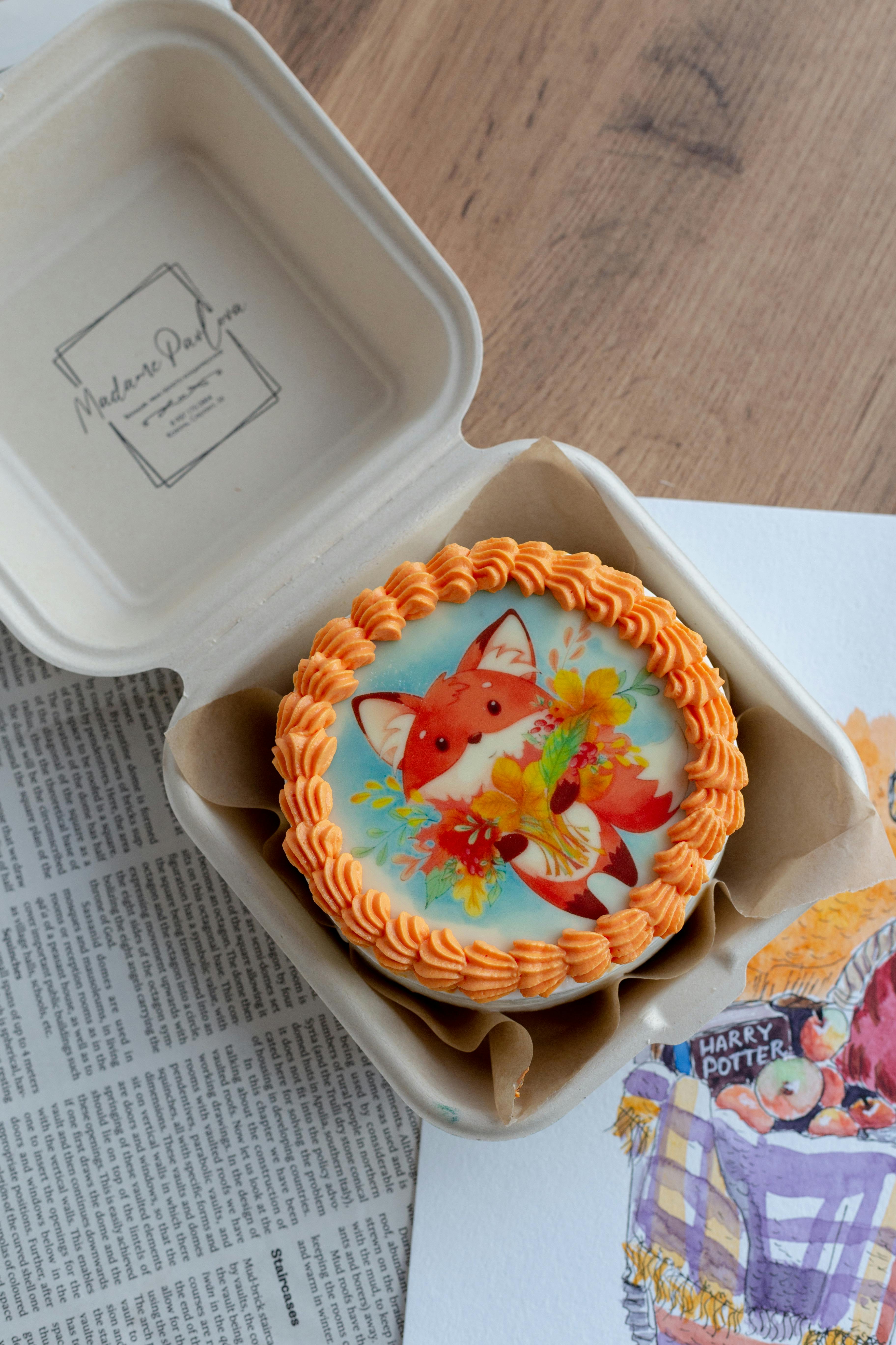 Homemade Cake Decorated with a Cartoon Fox Drawing · Free Stock Photo