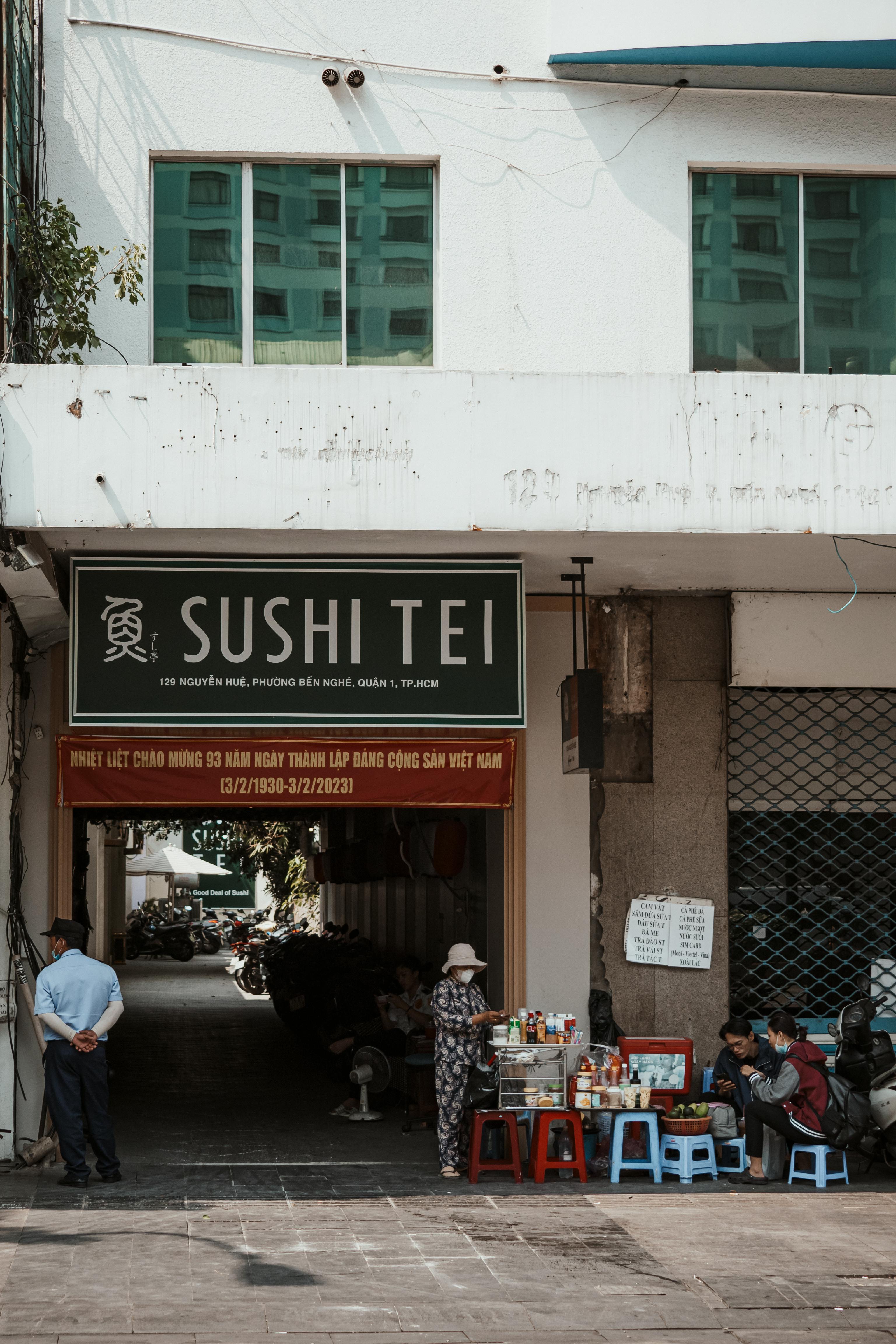 Woman Selling Merchandise in the Street · Free Stock Photo
