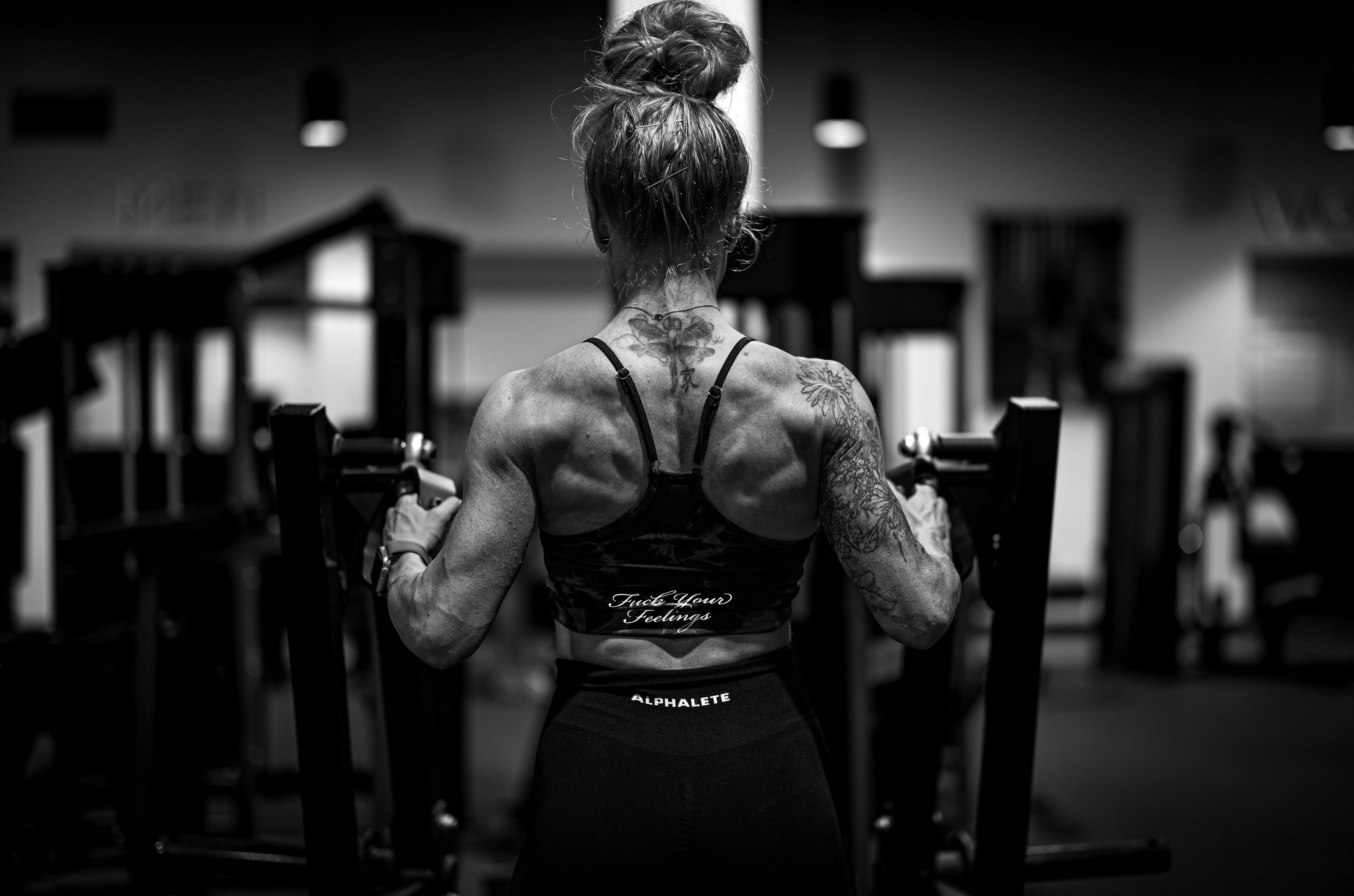 Muscular Back of a Exercising Bodybuilder · Free Stock Photo