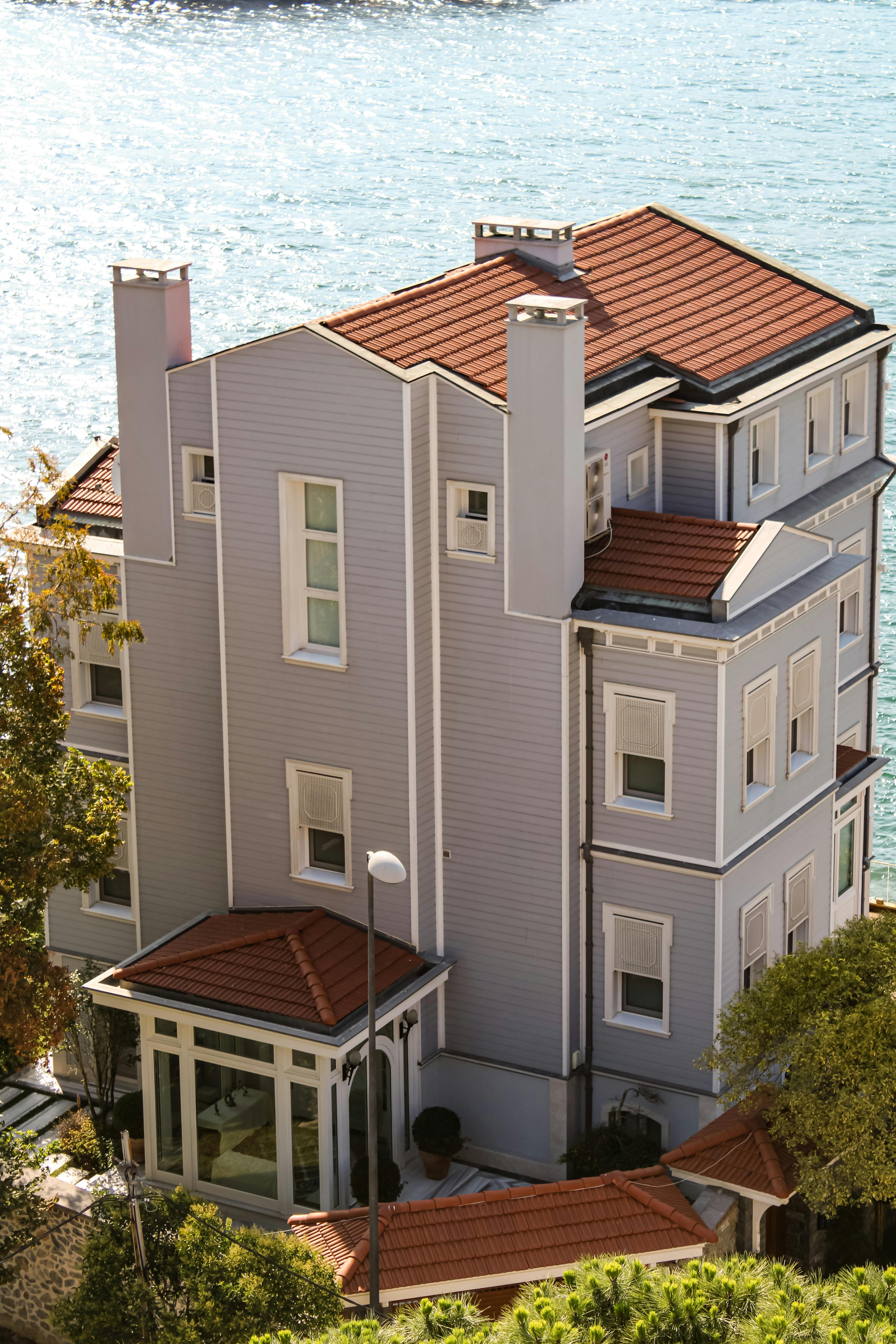 Residential Building by River · Free Stock Photo