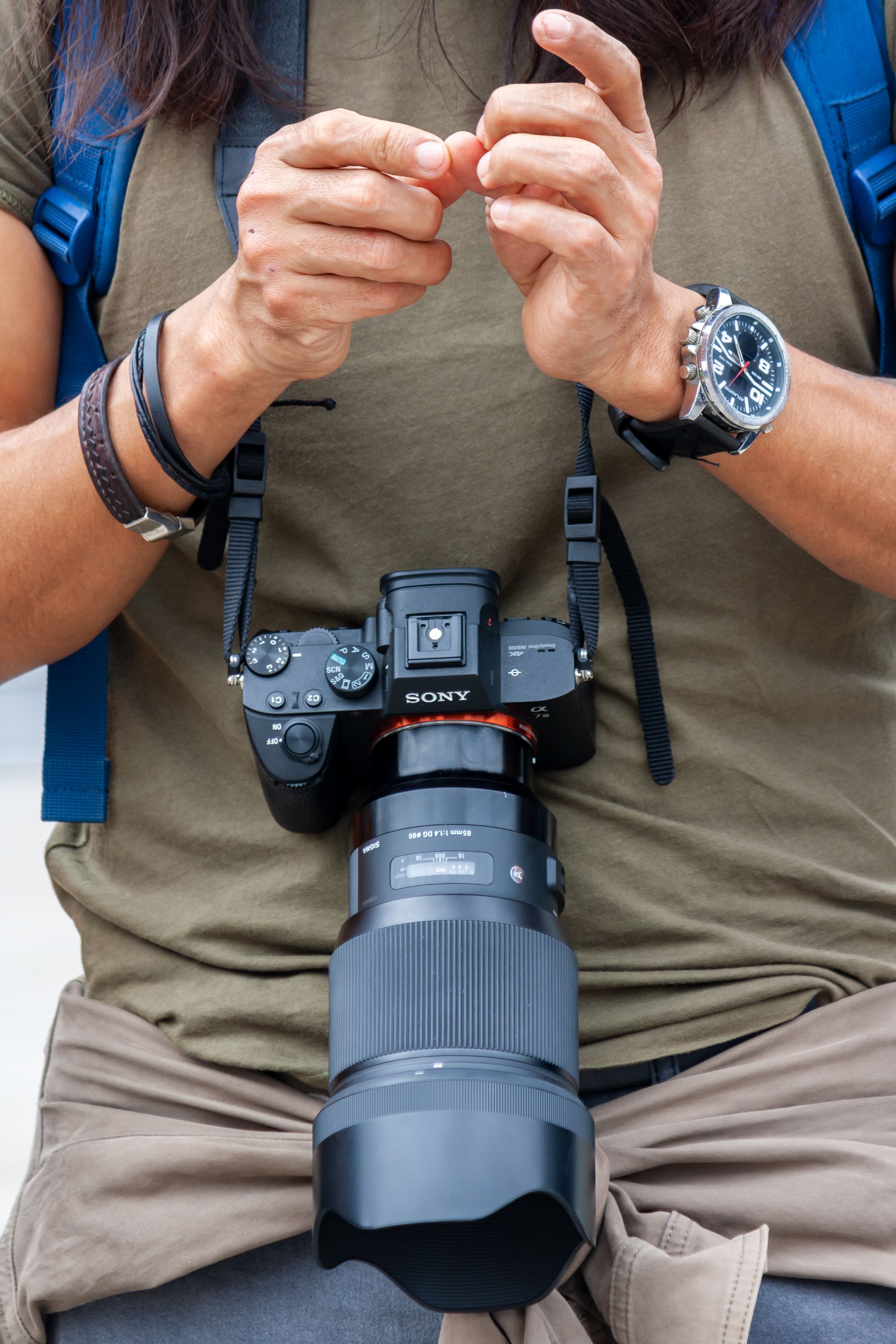 Close-up of a Camera in Photographers Hands · Free Stock Photo