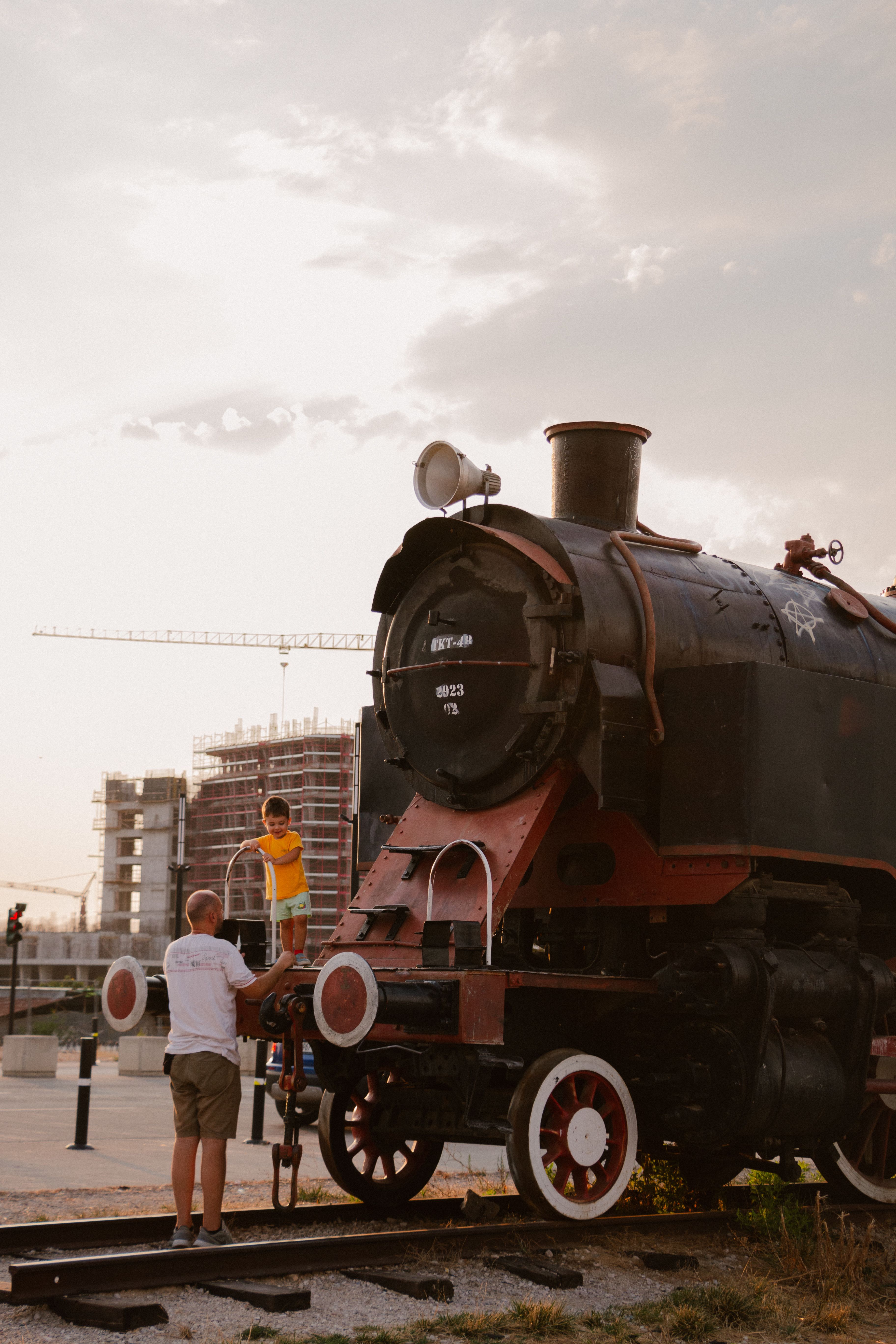 Vintage Steam Locomotive on Display Outdoors · Free Stock Photo