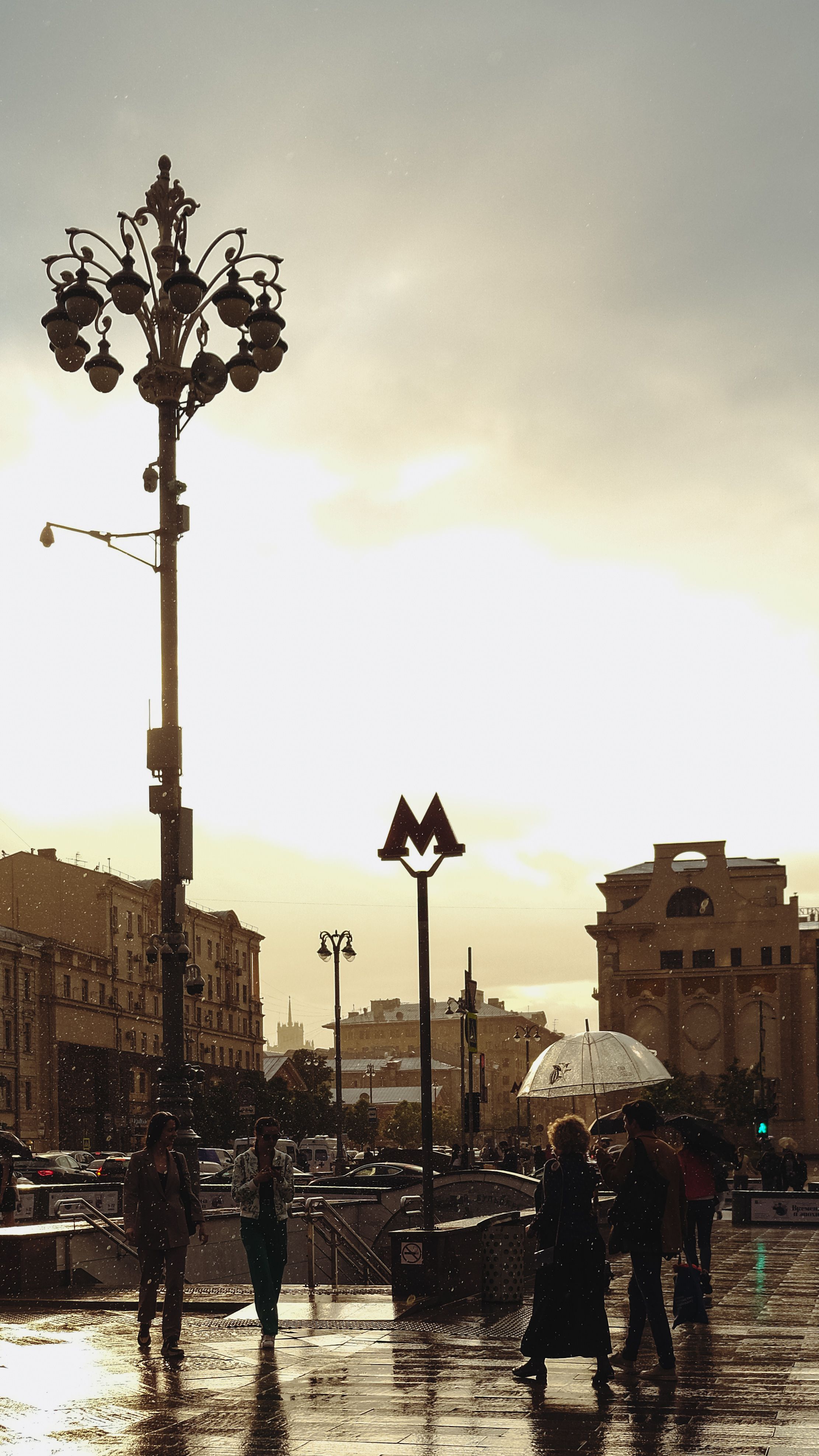 People Walking in Rain Near Subway Tunnel Entrance in City · Free Stock ...