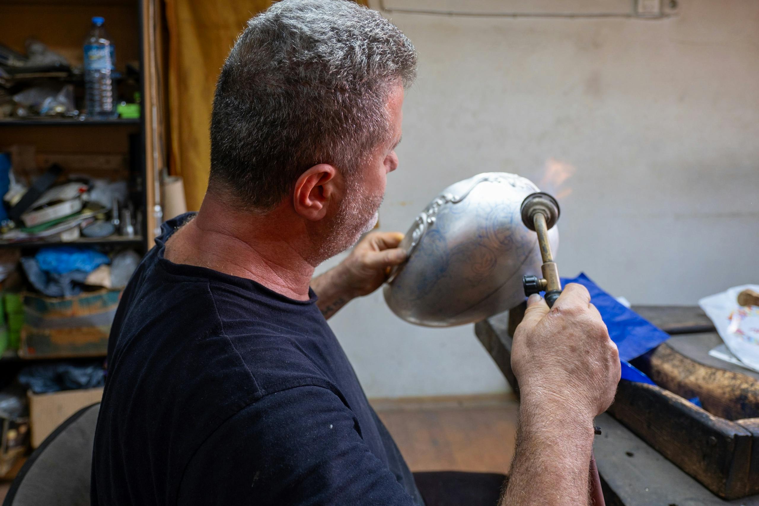 Man Working in Workshop · Free Stock Photo