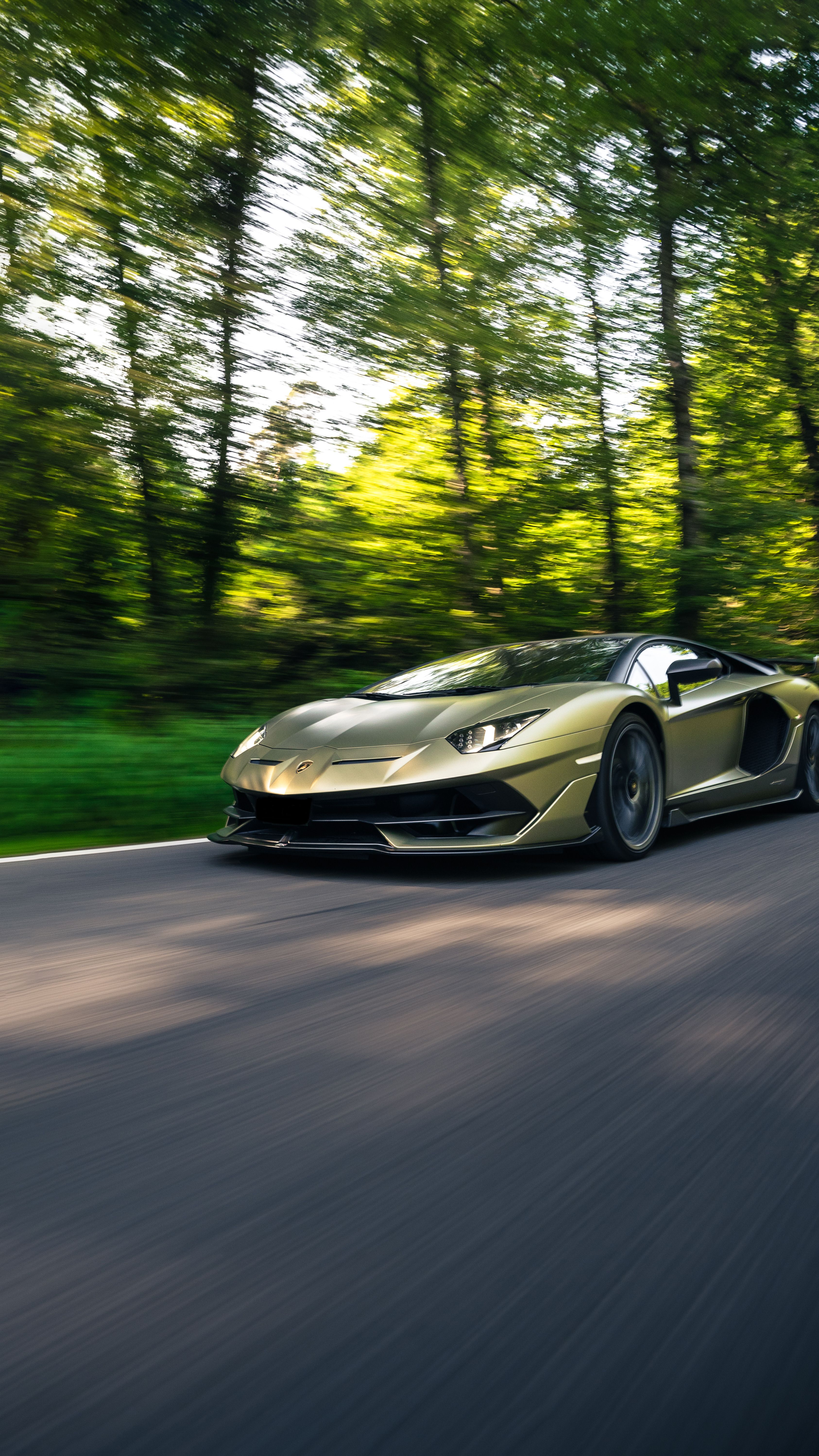 A Luxury Sports Car on a Road · Free Stock Photo