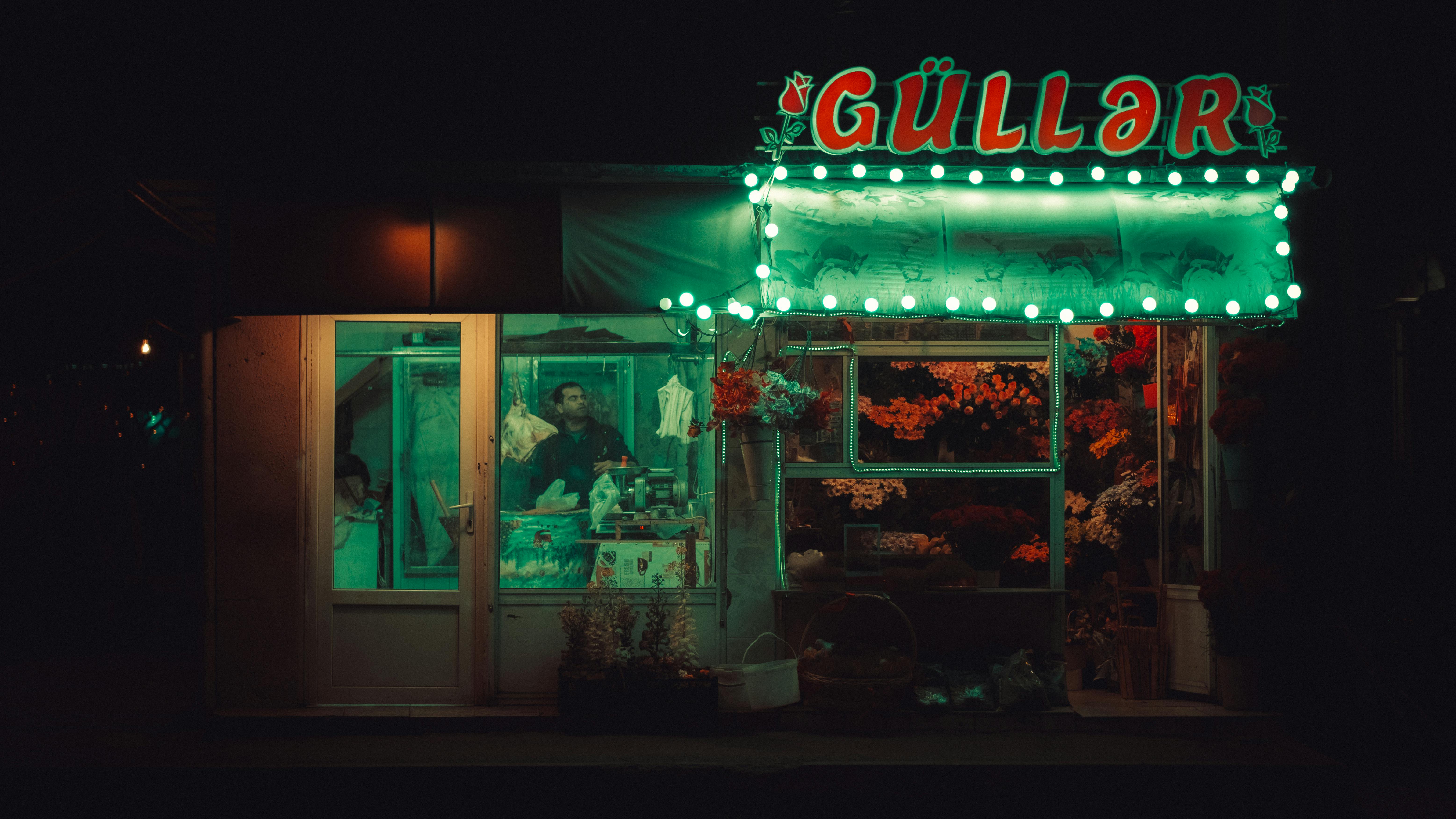 Neon Sign on a Building · Free Stock Photo