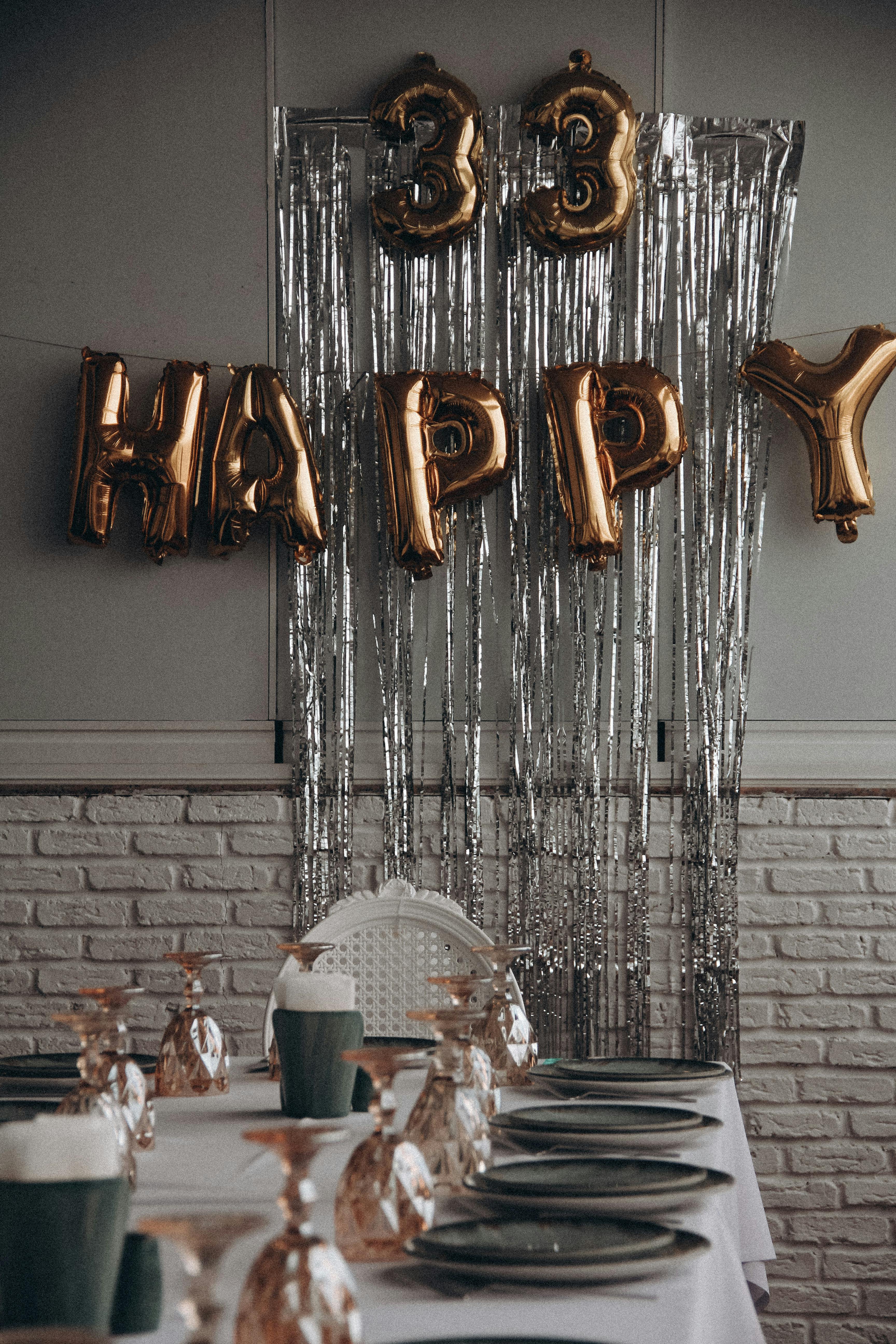 Birthday Decorations Hanging on a Restaurant Hall Walls · Free Stock Photo