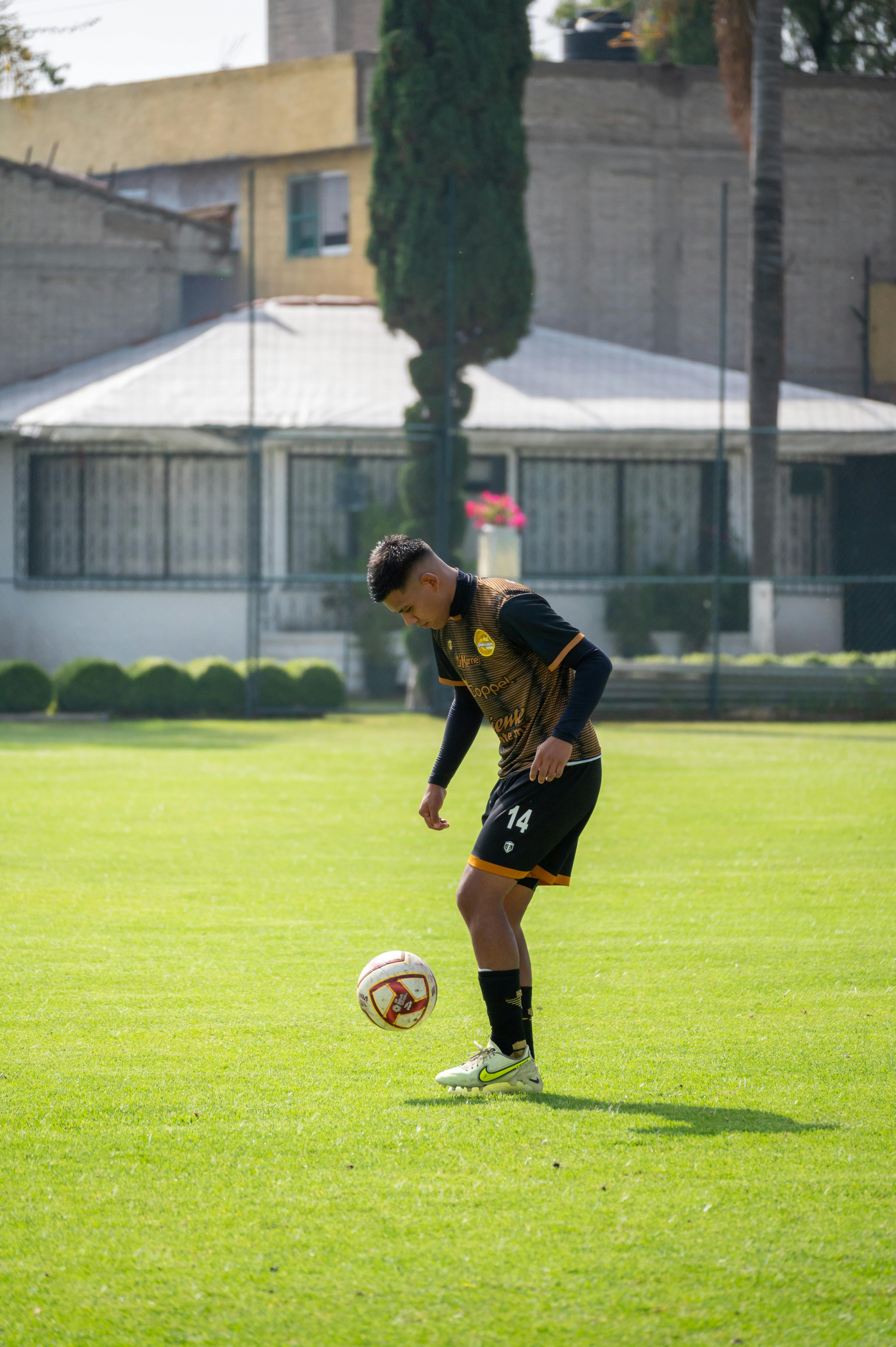 Man Juggling Soccer Ball · Free Stock Photo