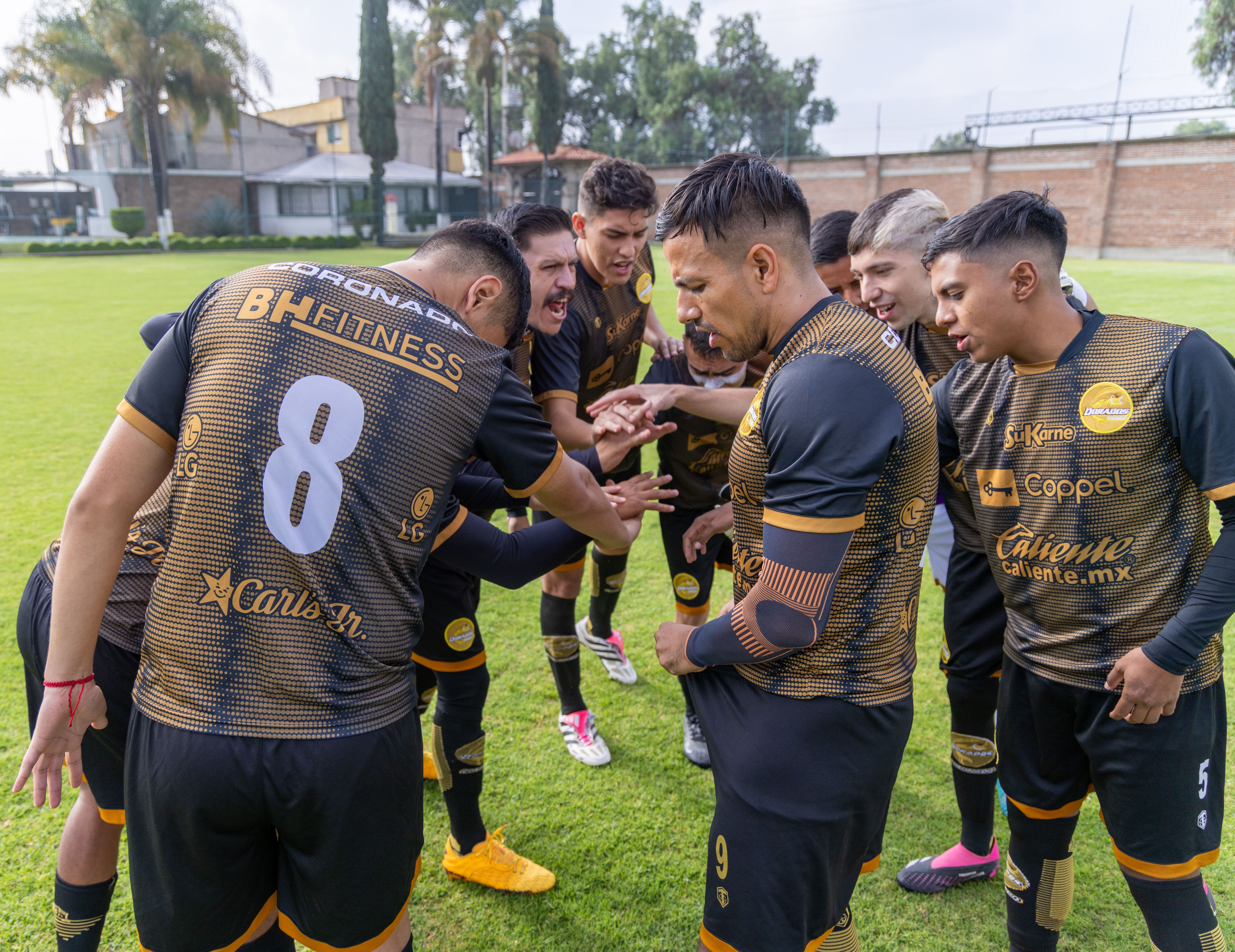 Soccer Players Making Huddle before Match · Free Stock Photo