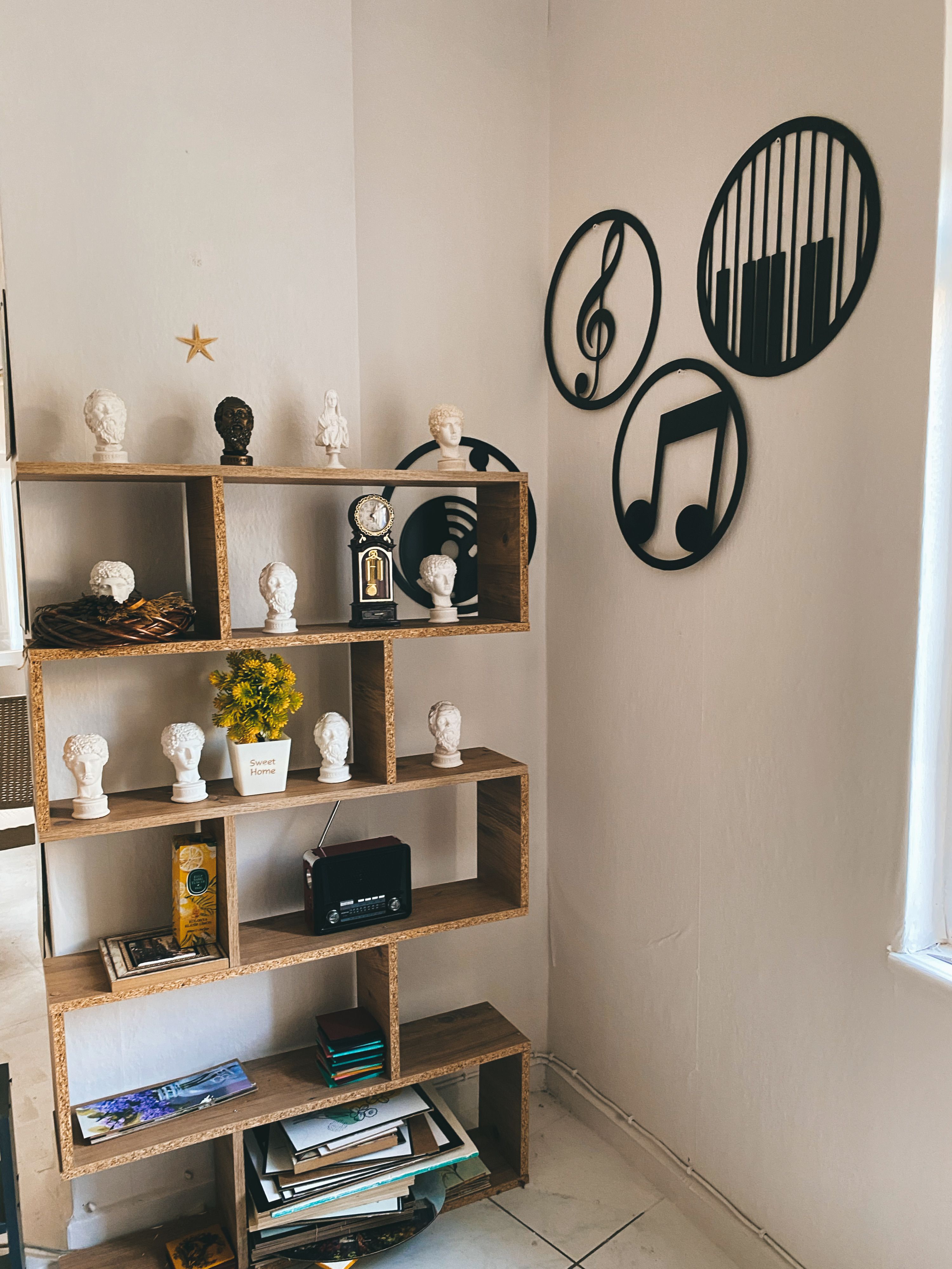 Bookcase with Music Theme Objects · Free Stock Photo