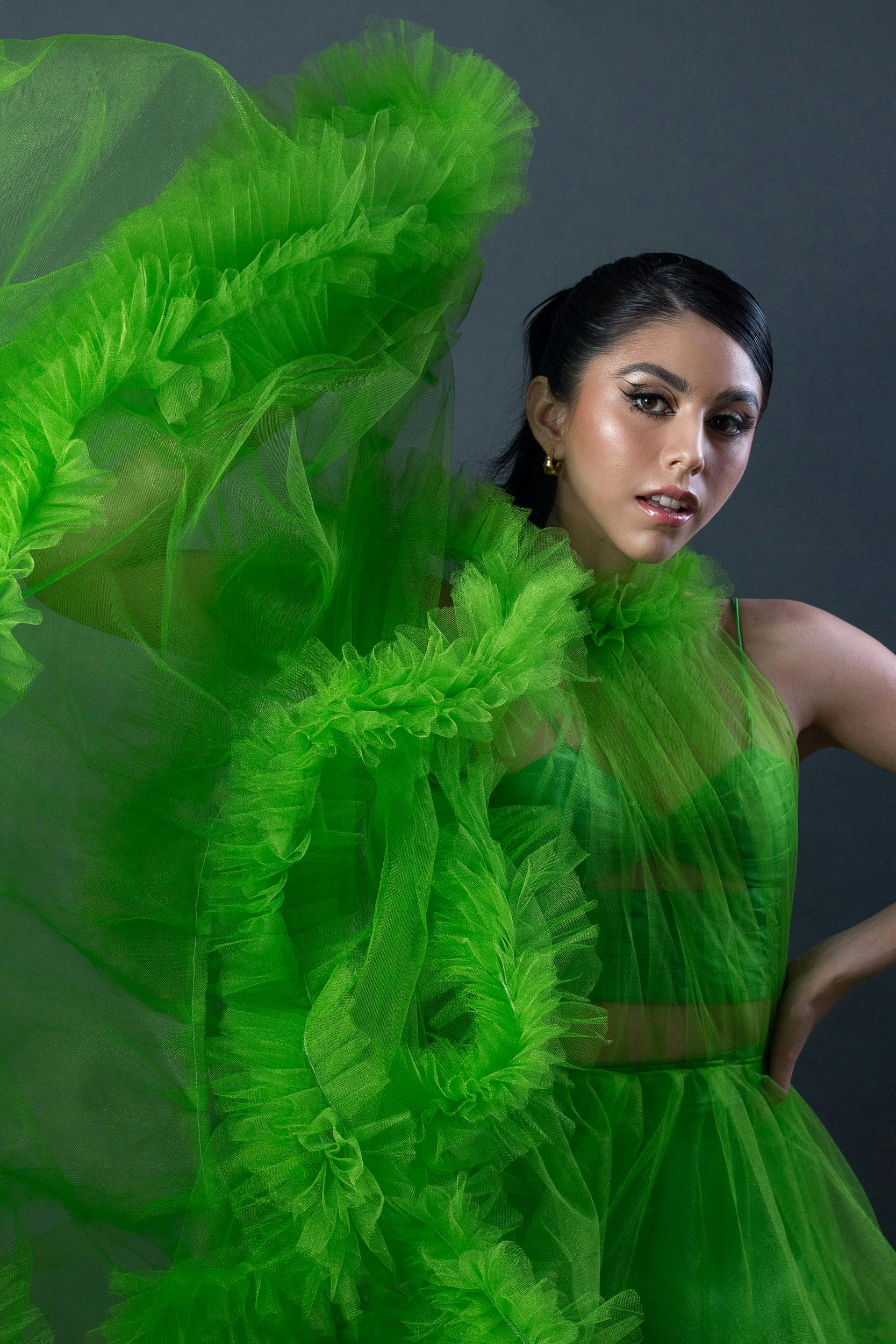Woman in Golden Glamour Dress in Studio · Free Stock Photo