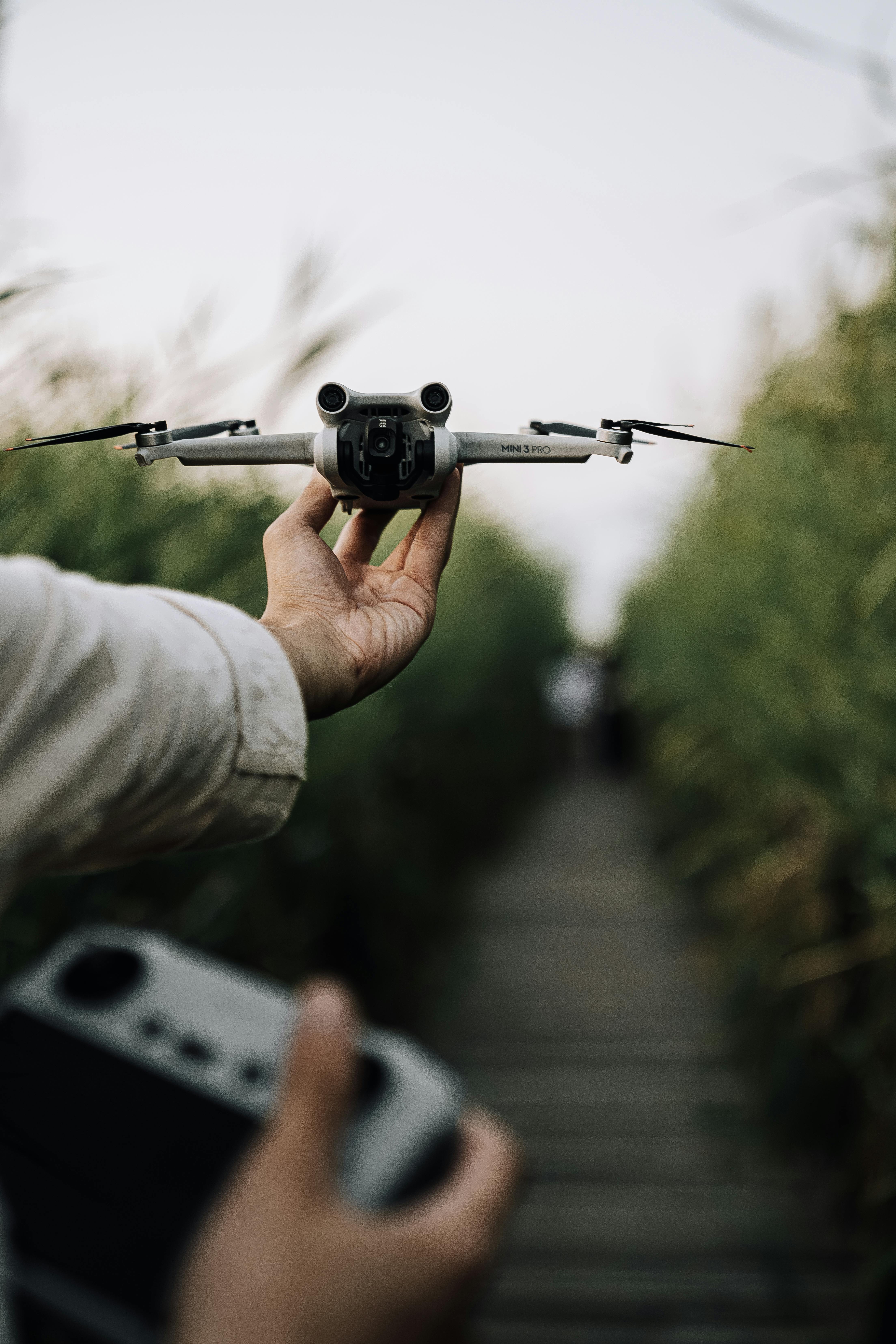 Hands Holding Drone and Controller · Free Stock Photo